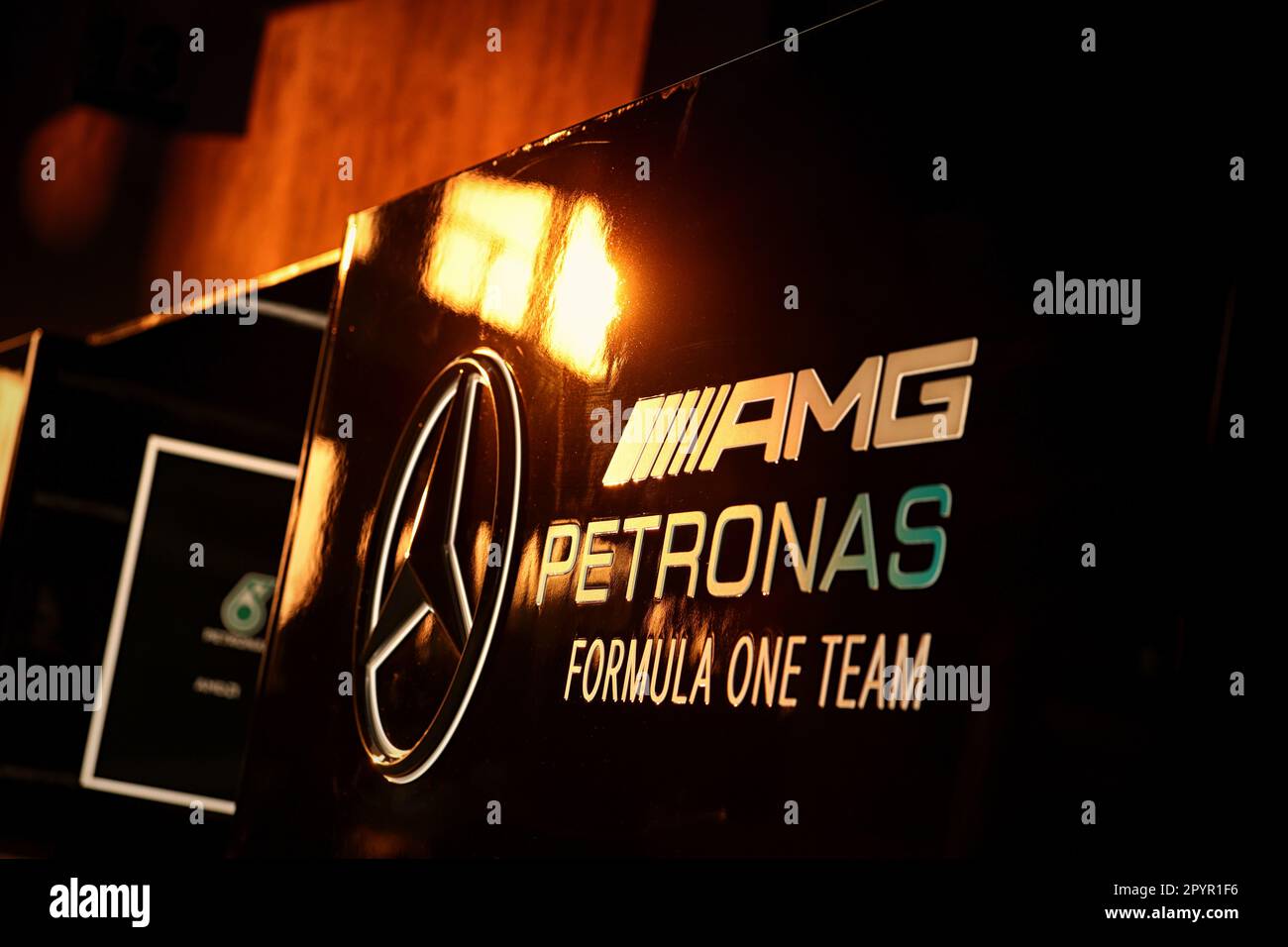 Circuit atmosphere - Mercedes AMG F1 logo at sunset. Credit: James Moy ...
