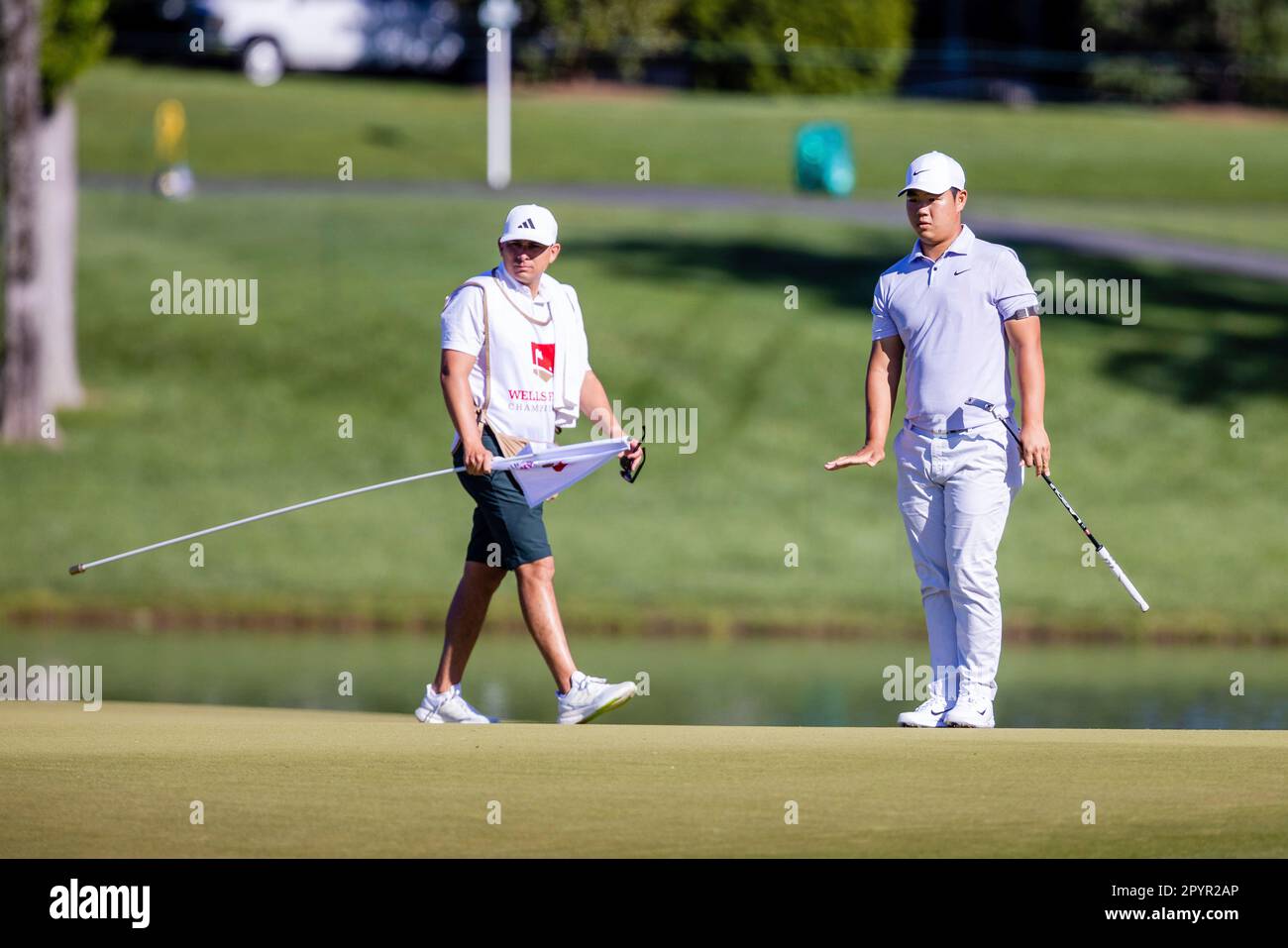 May 4, 2023: Tom Kim putts for birdie on the 17th green during the first round of the 2023 Wells ...