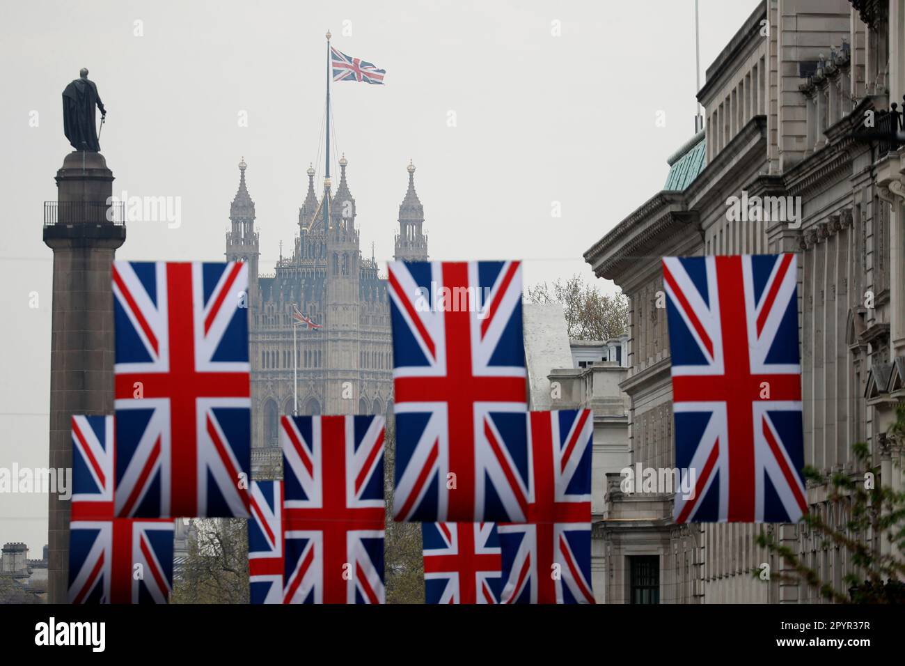 London England, UK. 04/05/2023, The House of Parlament is framed by ...