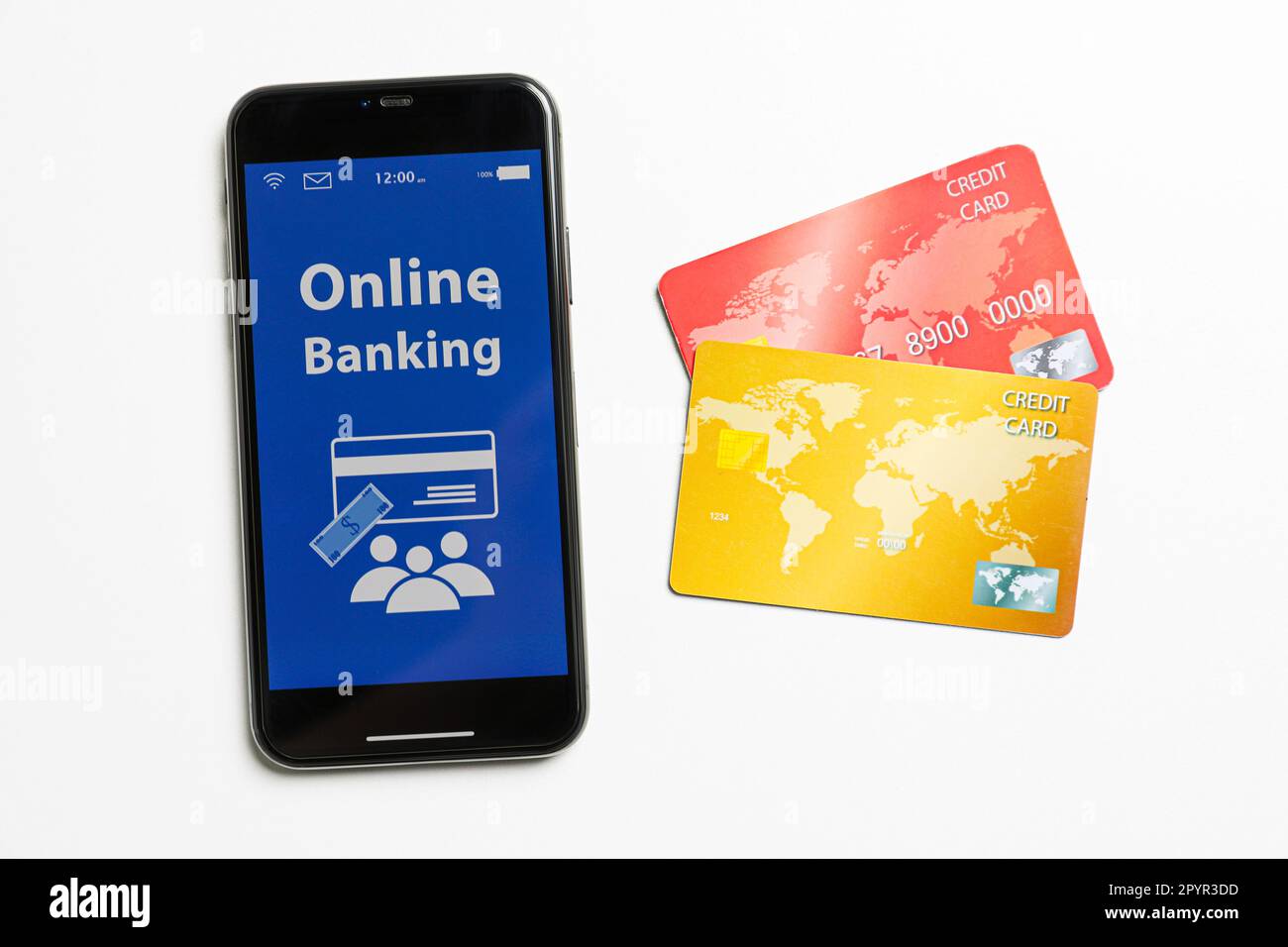 Smartphone with online banking app and credit cards on white background ...