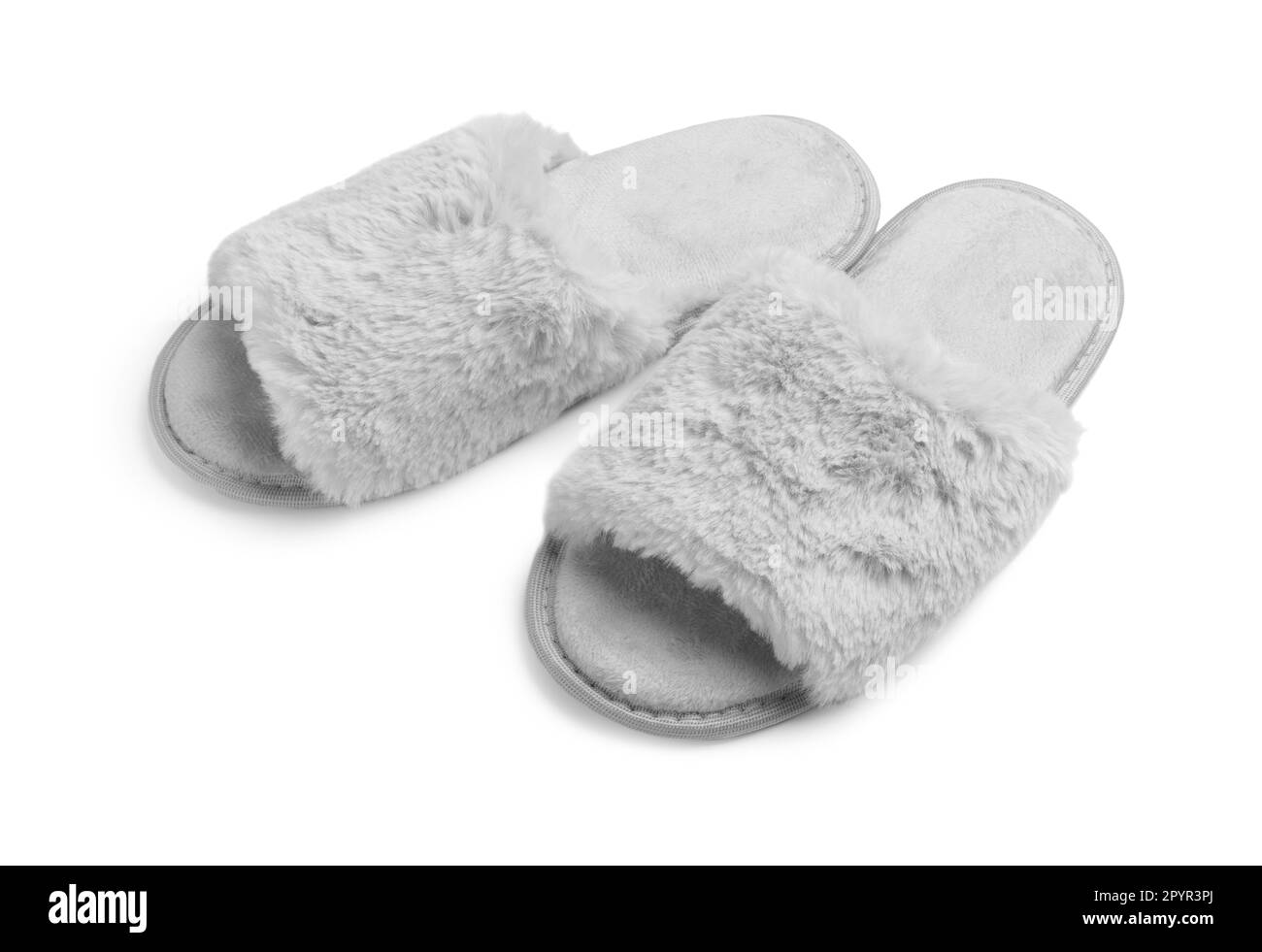 Pair of soft fluffy slippers on white background Stock Photo - Alamy