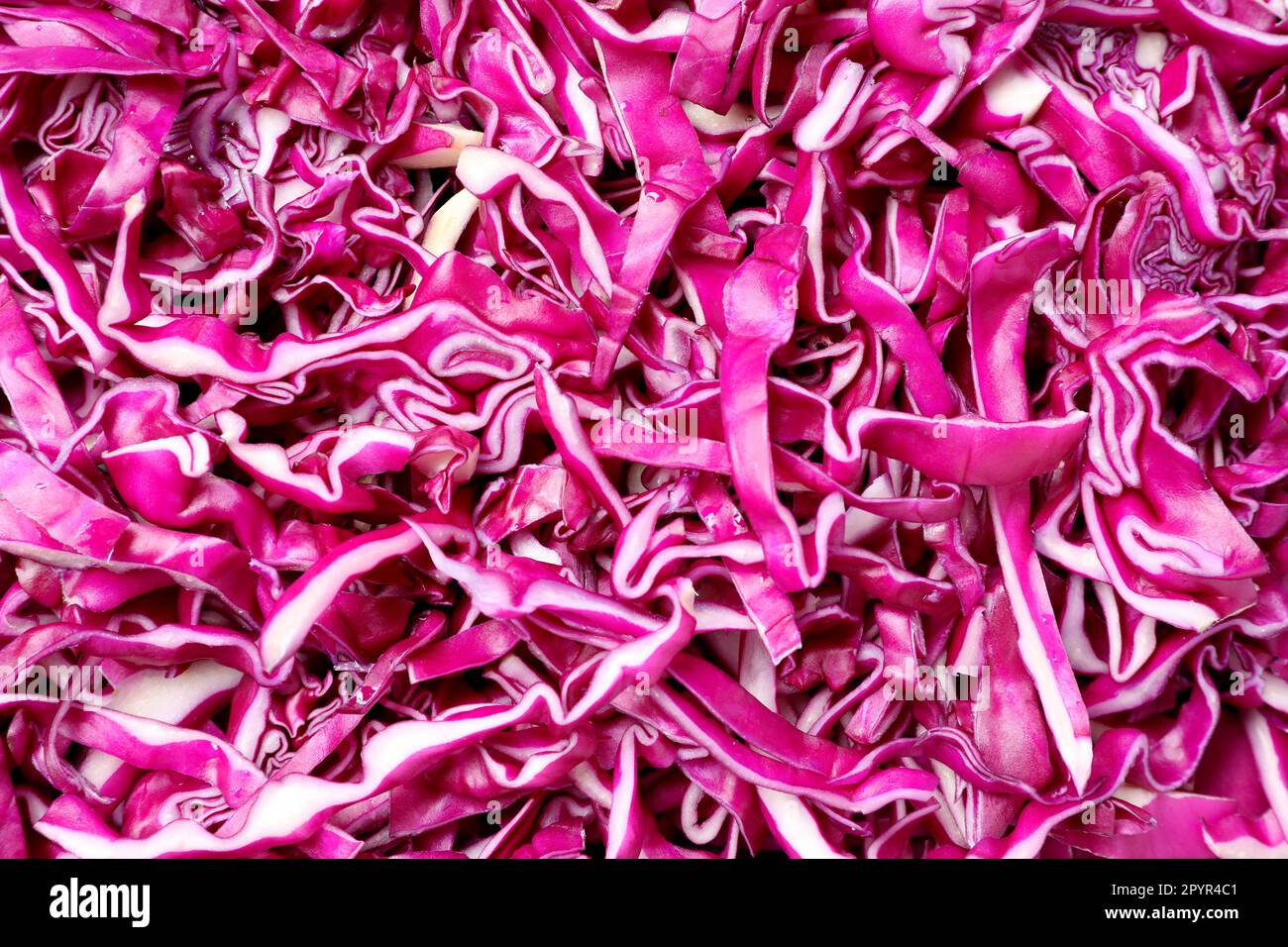 Tasty fresh shredded red cabbage as background, closeup Stock Photo - Alamy
