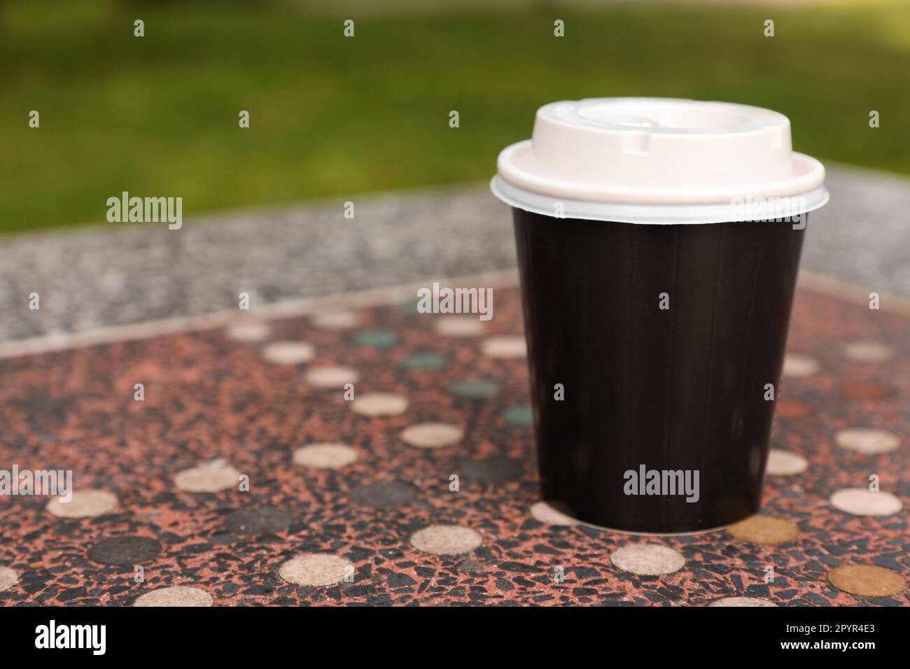 Paper cup on parapet table, space for text. Coffee to go Stock Photo ...