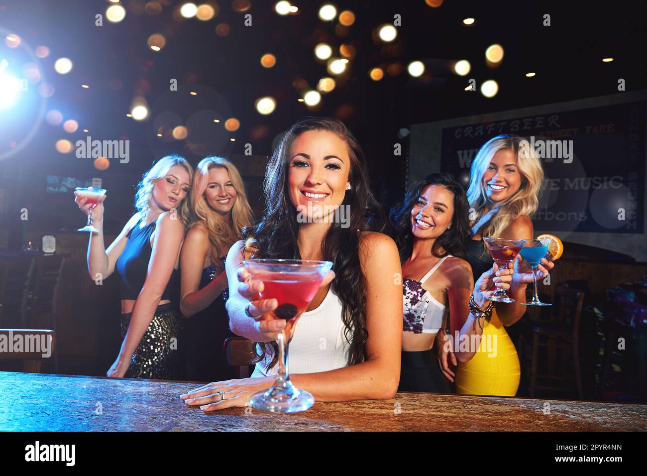 The ultimate girls night. young women partying in a nightclub Stock ...