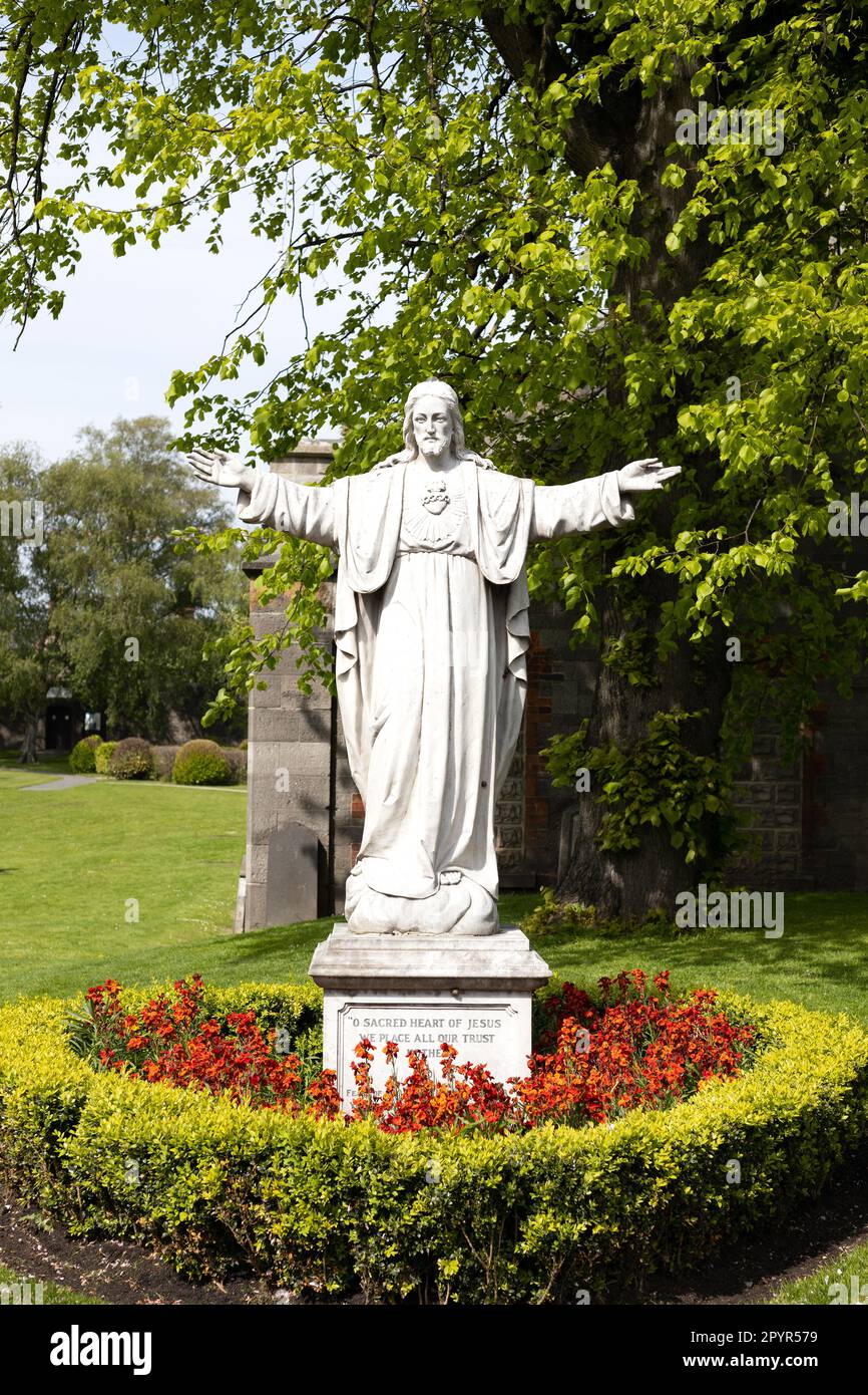 Sacred Heart of Jesus statue at Arbour Hill Cemetery in Dublin, Ireland ...