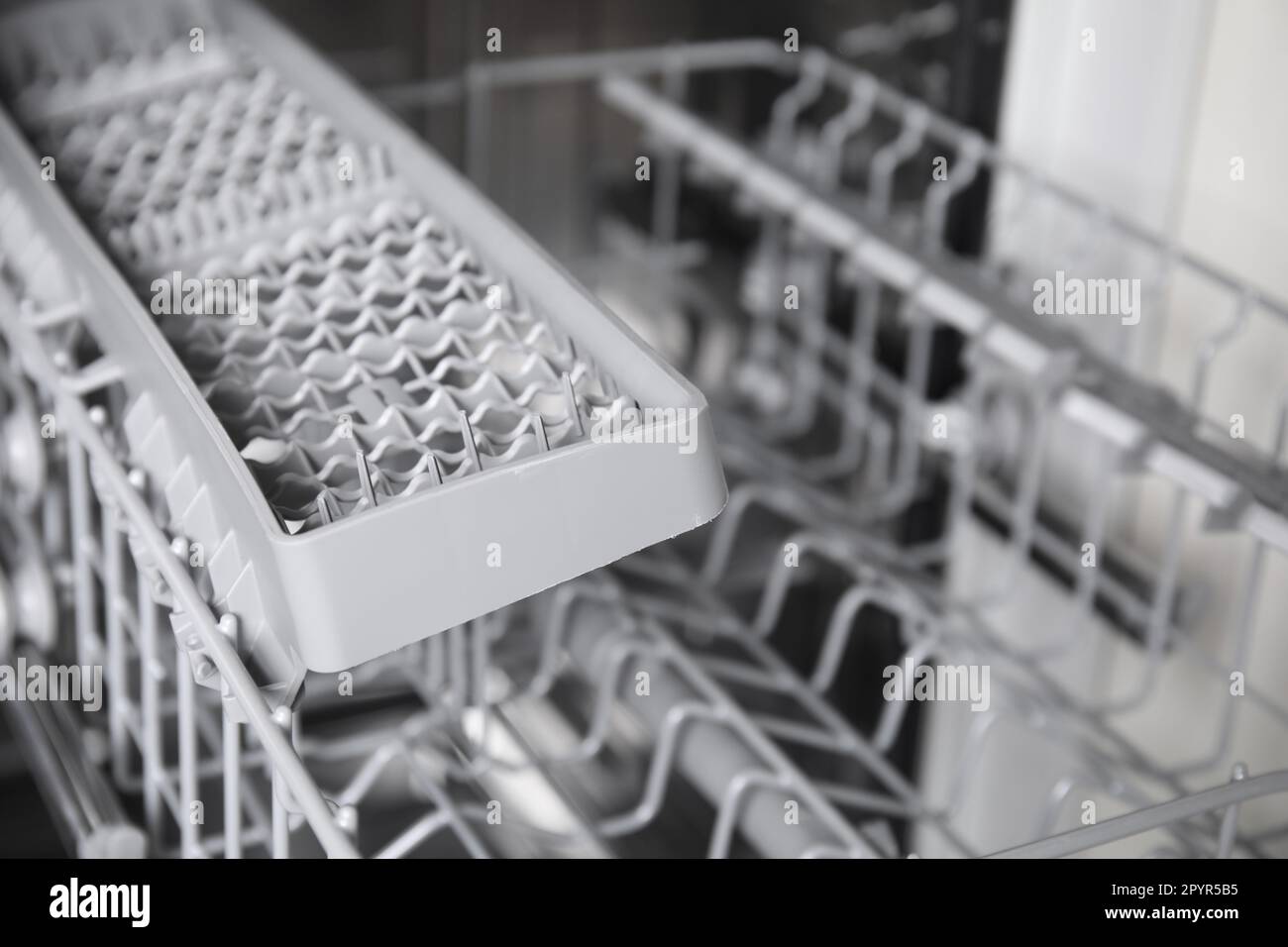 Open clean modern empty automatic dishwasher machine, closeup Stock ...