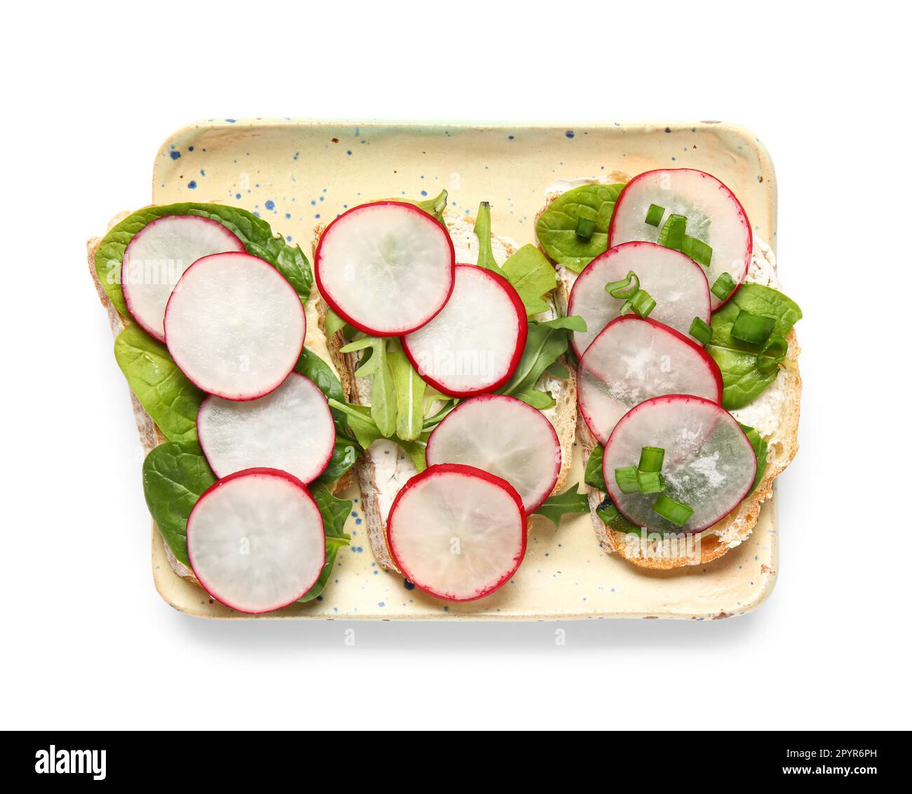 Tray with delicious radish bruschettas isolated on white background ...