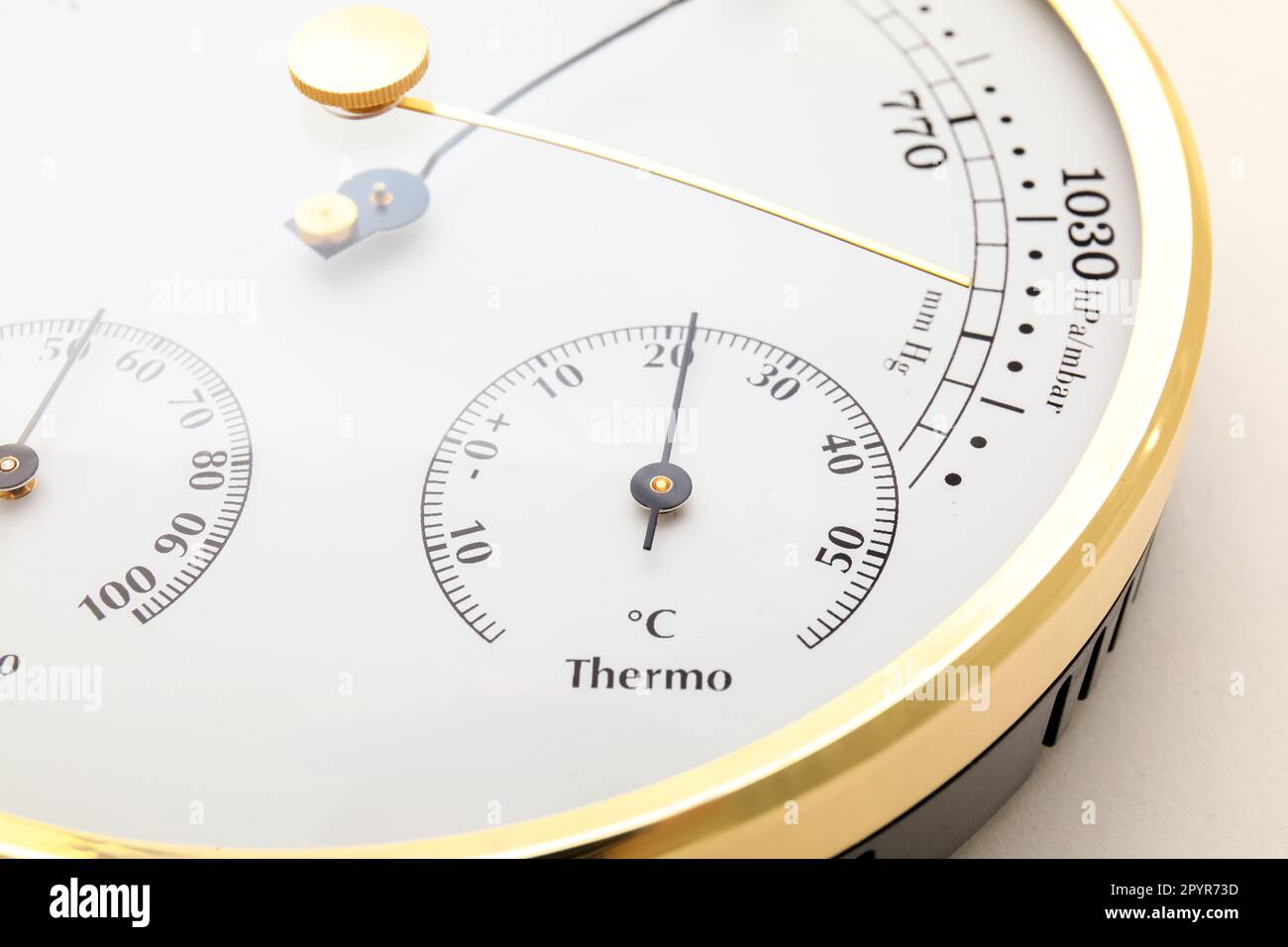 Aneroid barometer on white background, closeup Stock Photo - Alamy