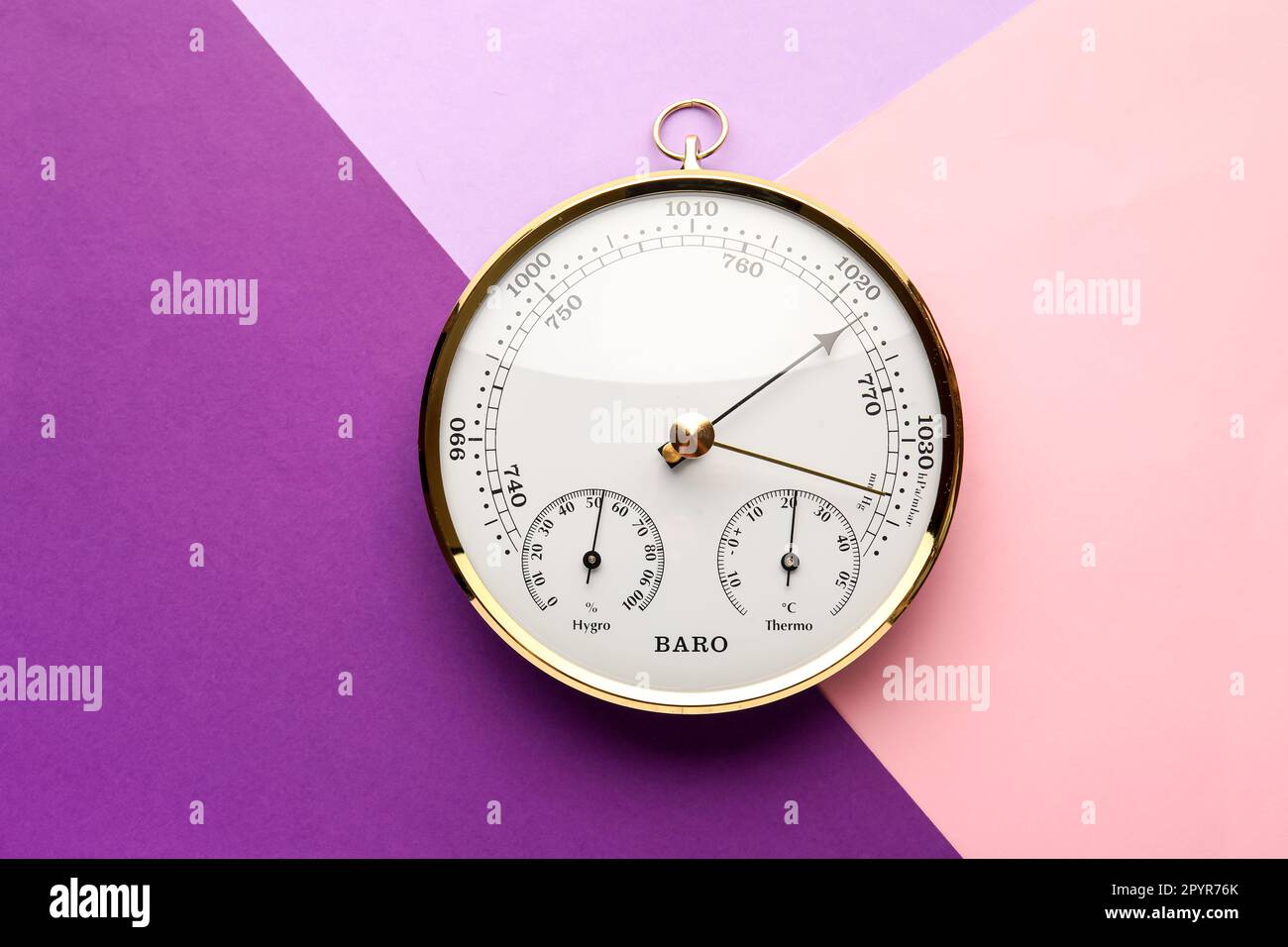 Aneroid barometer on colorful background Stock Photo - Alamy