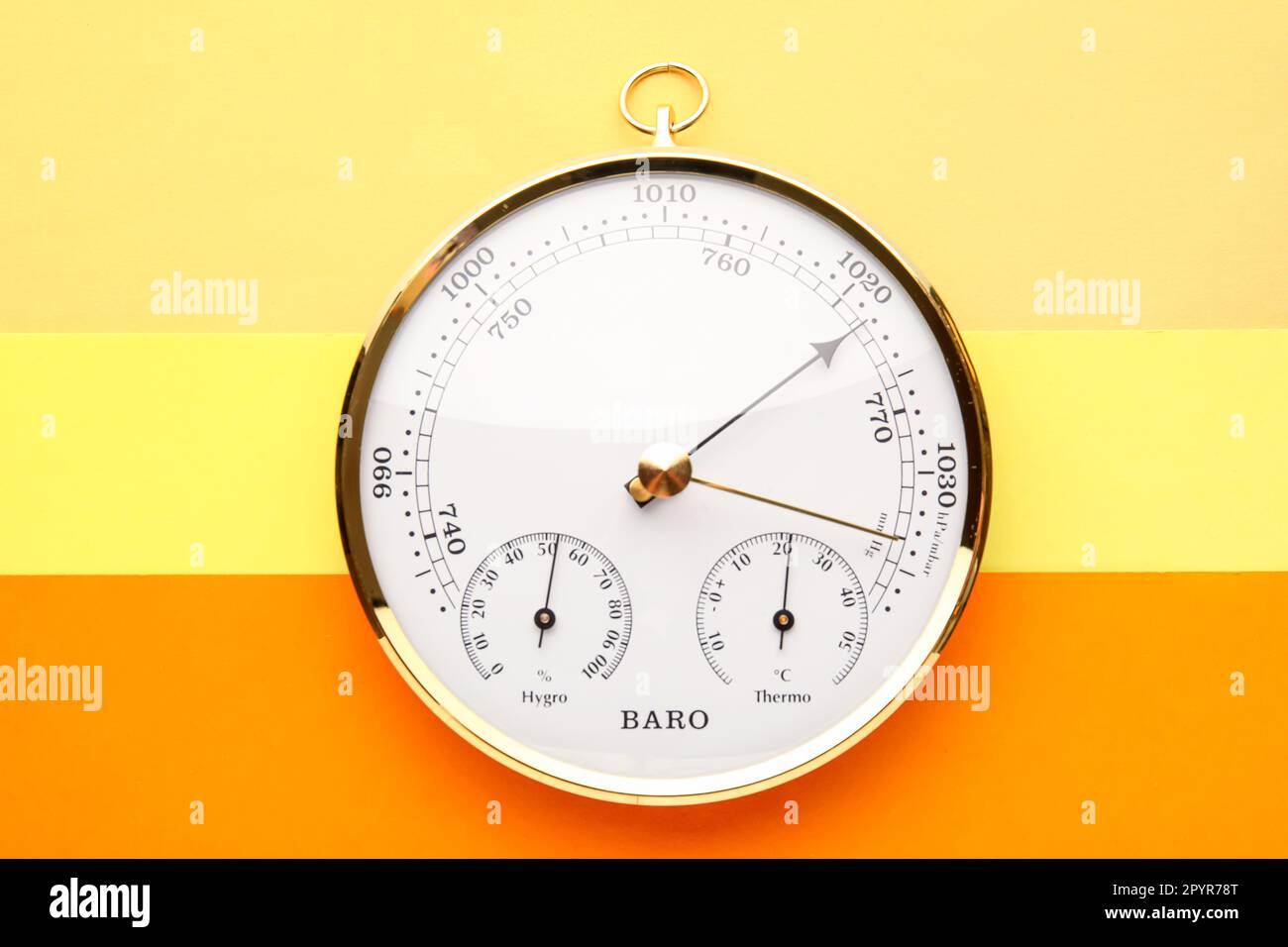 Aneroid barometer on colorful background Stock Photo - Alamy
