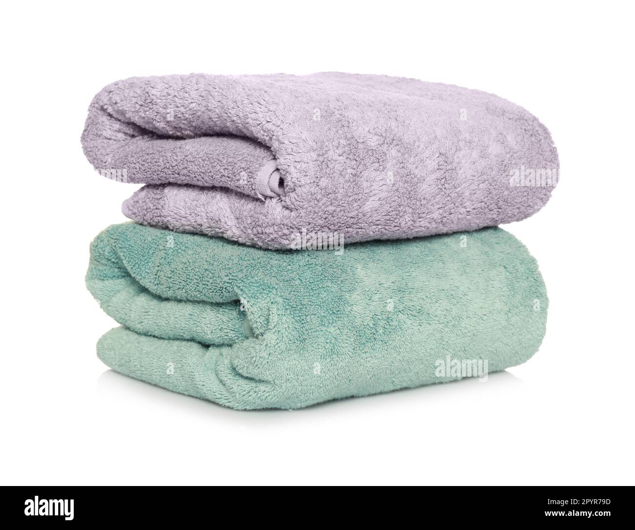 Folded soft terry towels on white background Stock Photo - Alamy