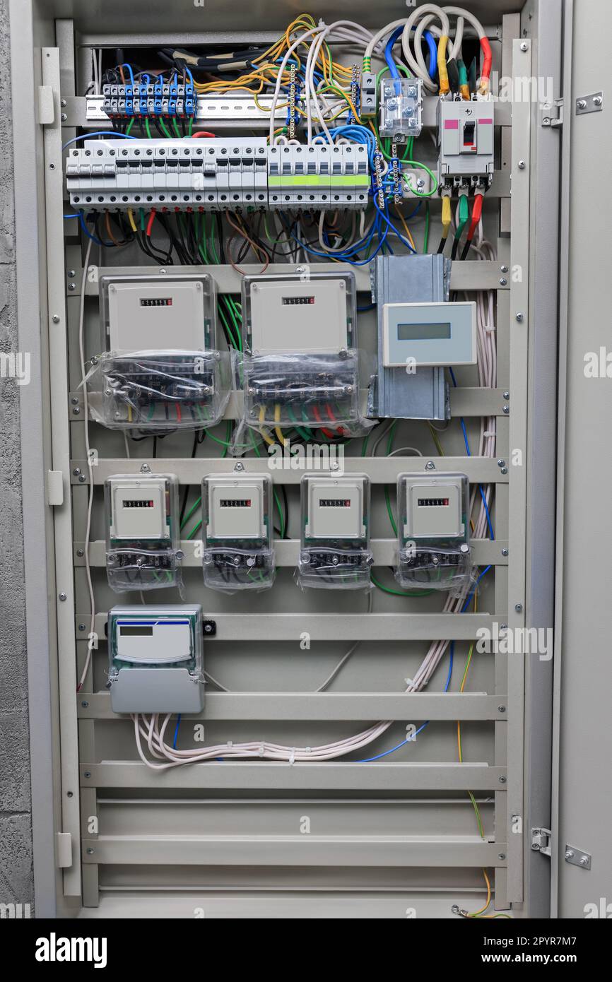Fuse box with many electric meters and wires Stock Photo - Alamy