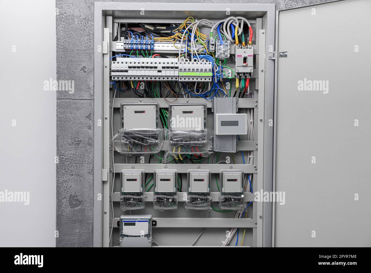 Fuse box with many electric meters and wires Stock Photo - Alamy
