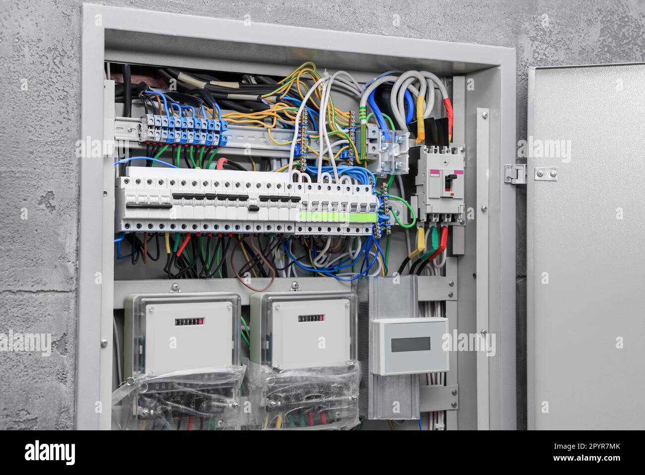 Fuse box with many electric meters and wires Stock Photo - Alamy