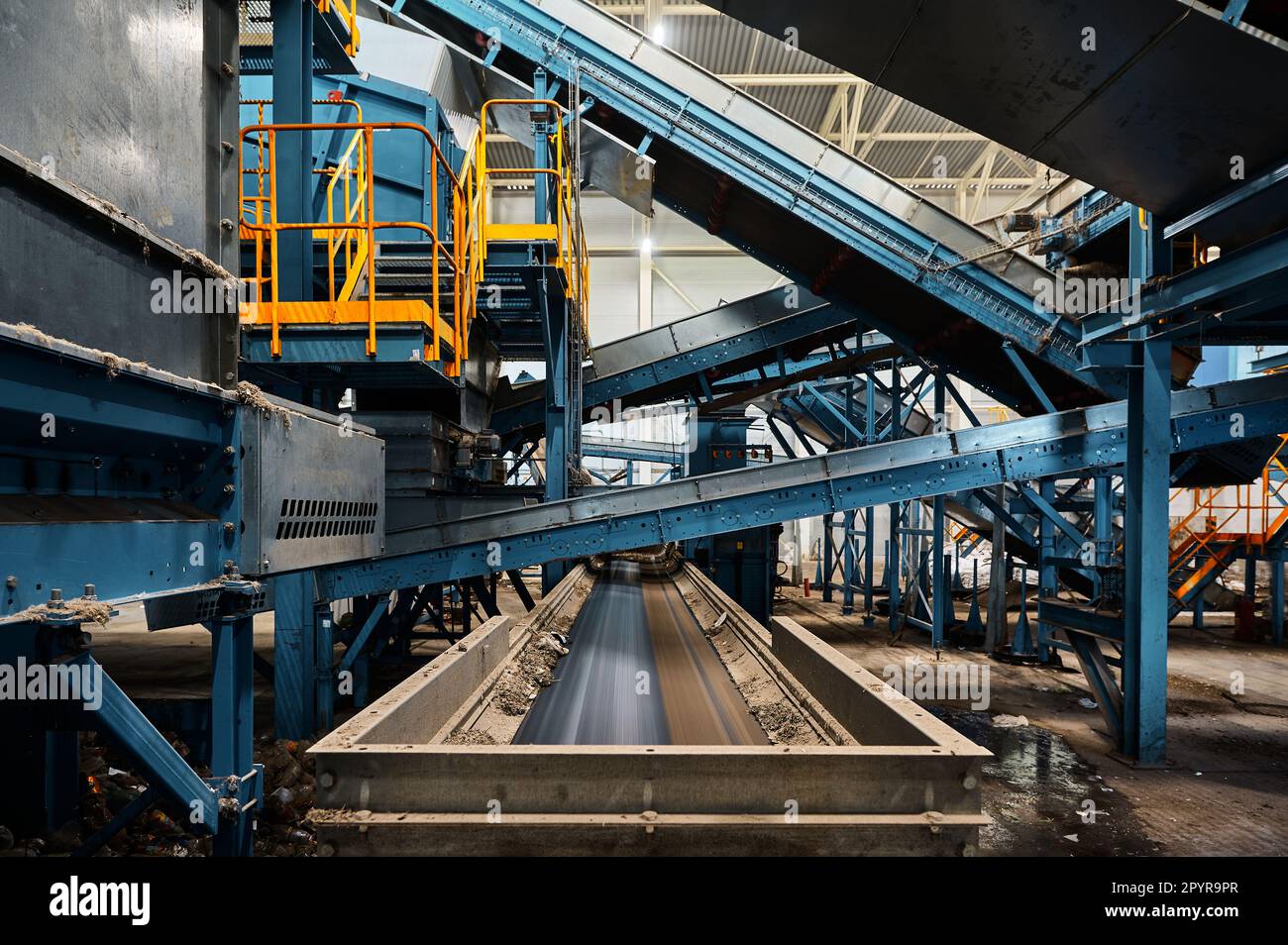 Large production line with conveyors carrying trash at plant Stock Photo - Alamy