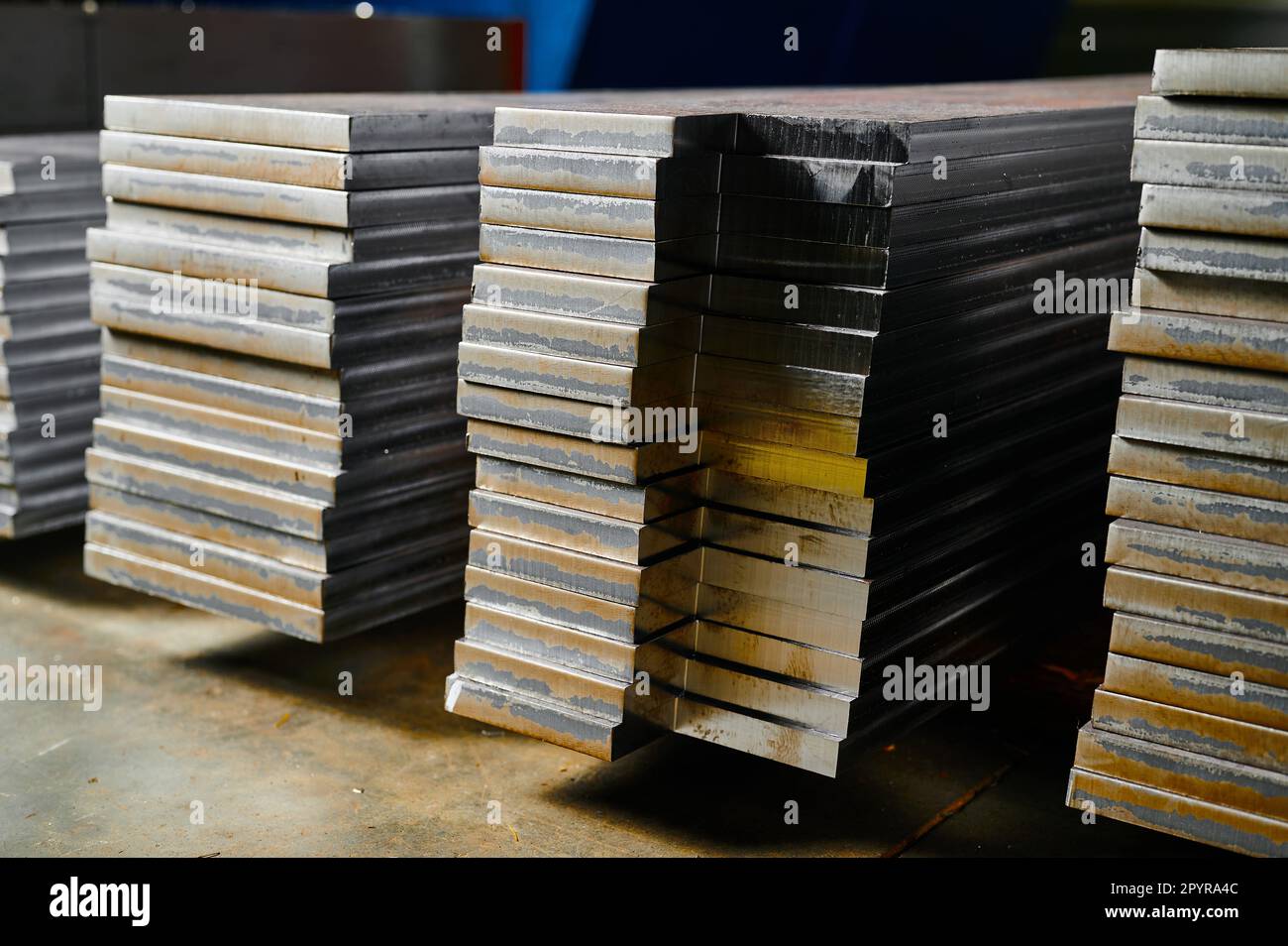 Steel details with ground edges and corners in storage Stock Photo - Alamy
