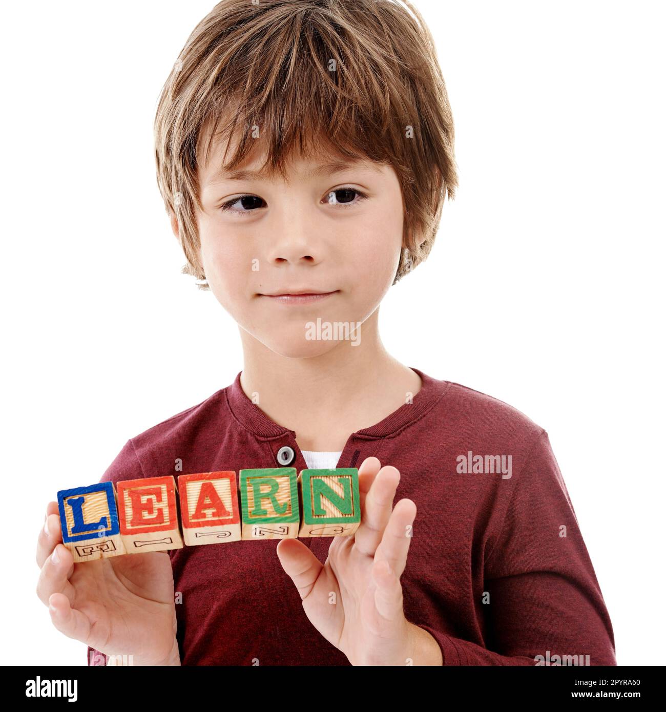 Theres something new to learn everyday. Studio shot of a cute little ...