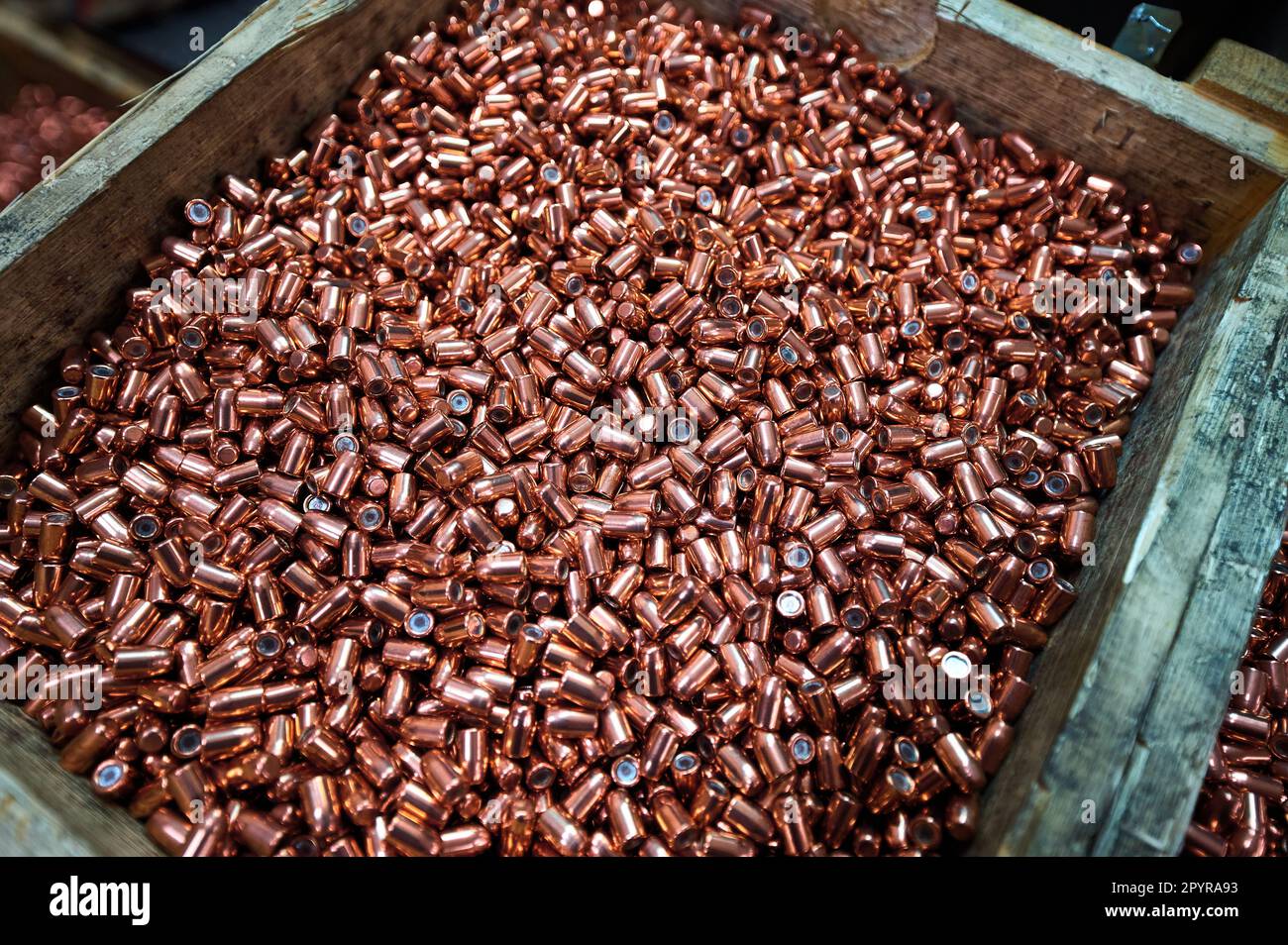 Bullets in large wooden crate at weapon production plant Stock Photo ...