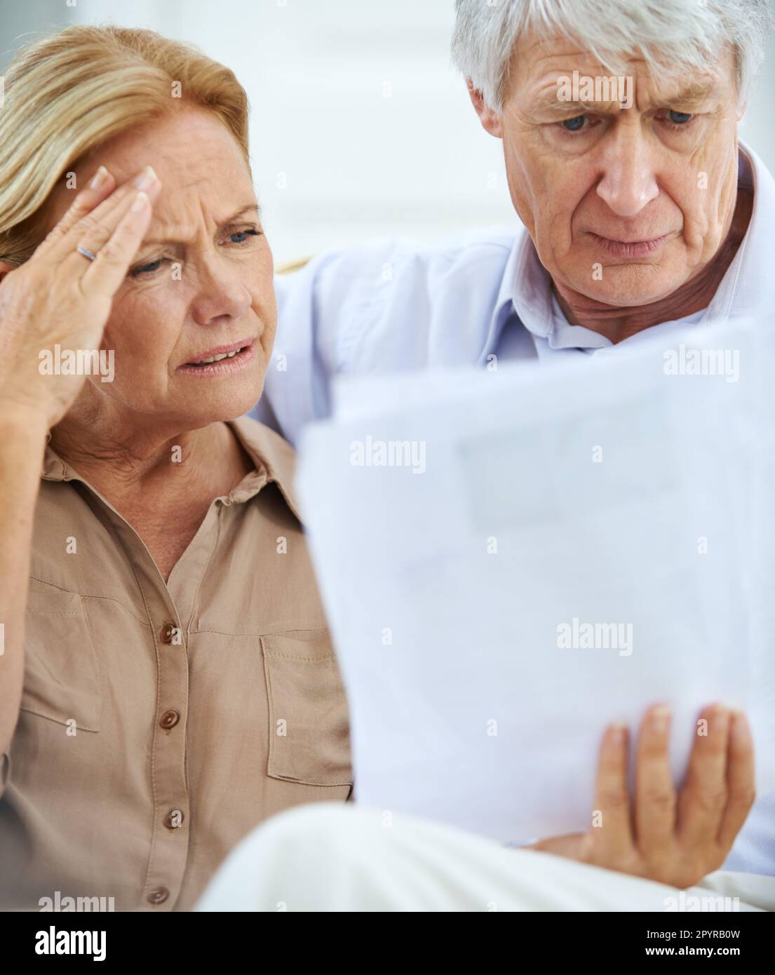 This is going to be a tough month. an elderly couple looking frustrated ...