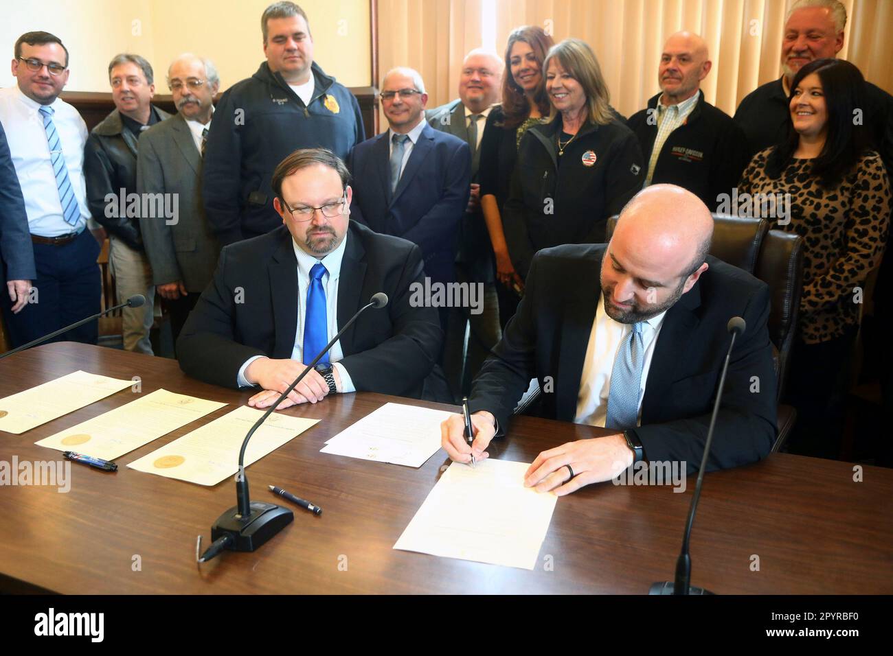 City of Hazleton Mayor Jeff Cusat left, looks on as Pennsylvania ...