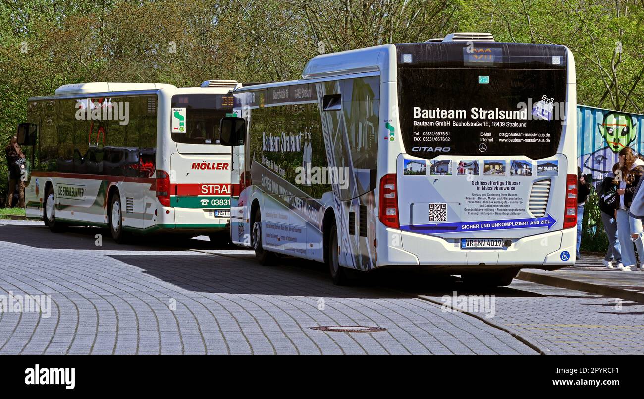 Grimmen, Germany. 03rd May, 2023. School buses pick up the children in ...