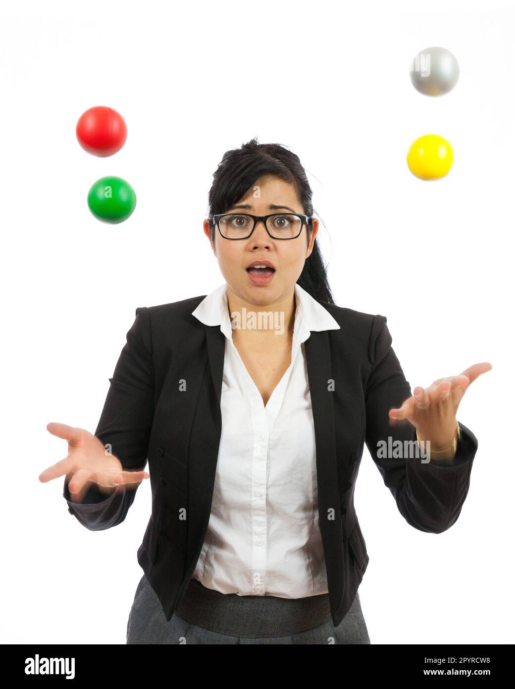 Business Woman With Multiple Balls in the Air Stock Photo - Alamy