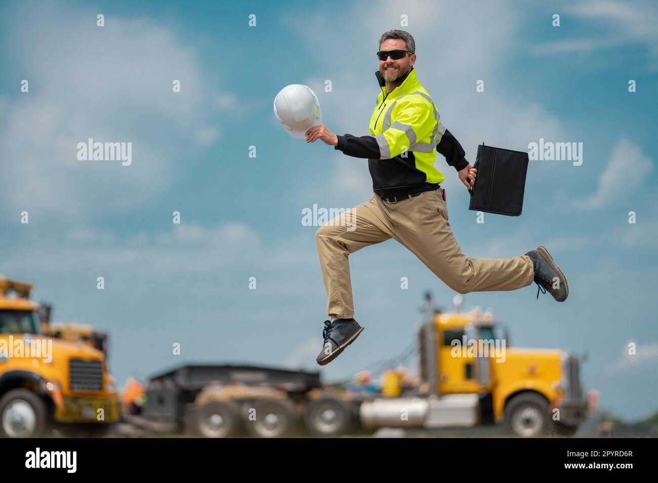 Construction builder excited jump hi-res stock photography and images ...