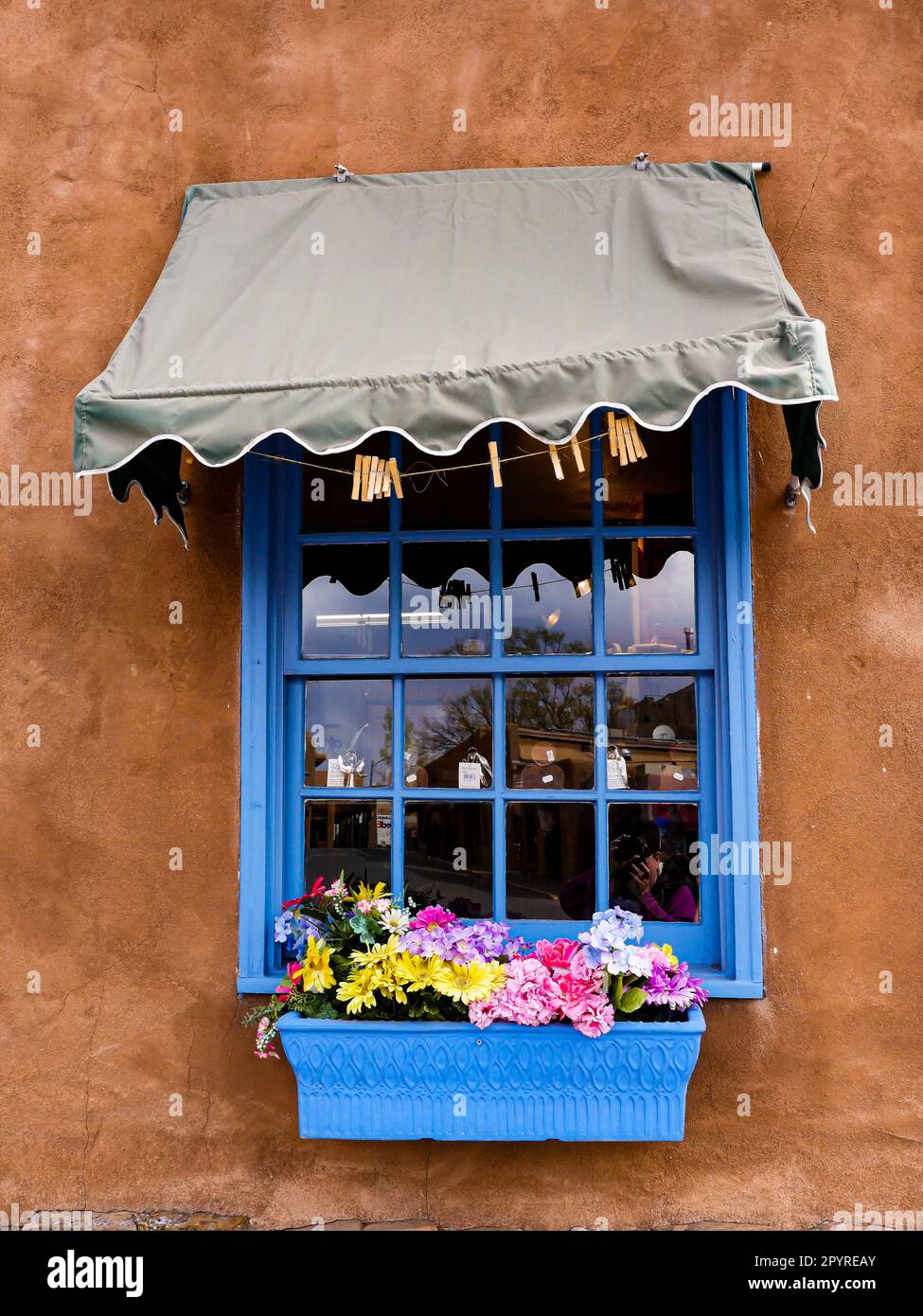 Blue window adobe building hi-res stock photography and images - Alamy