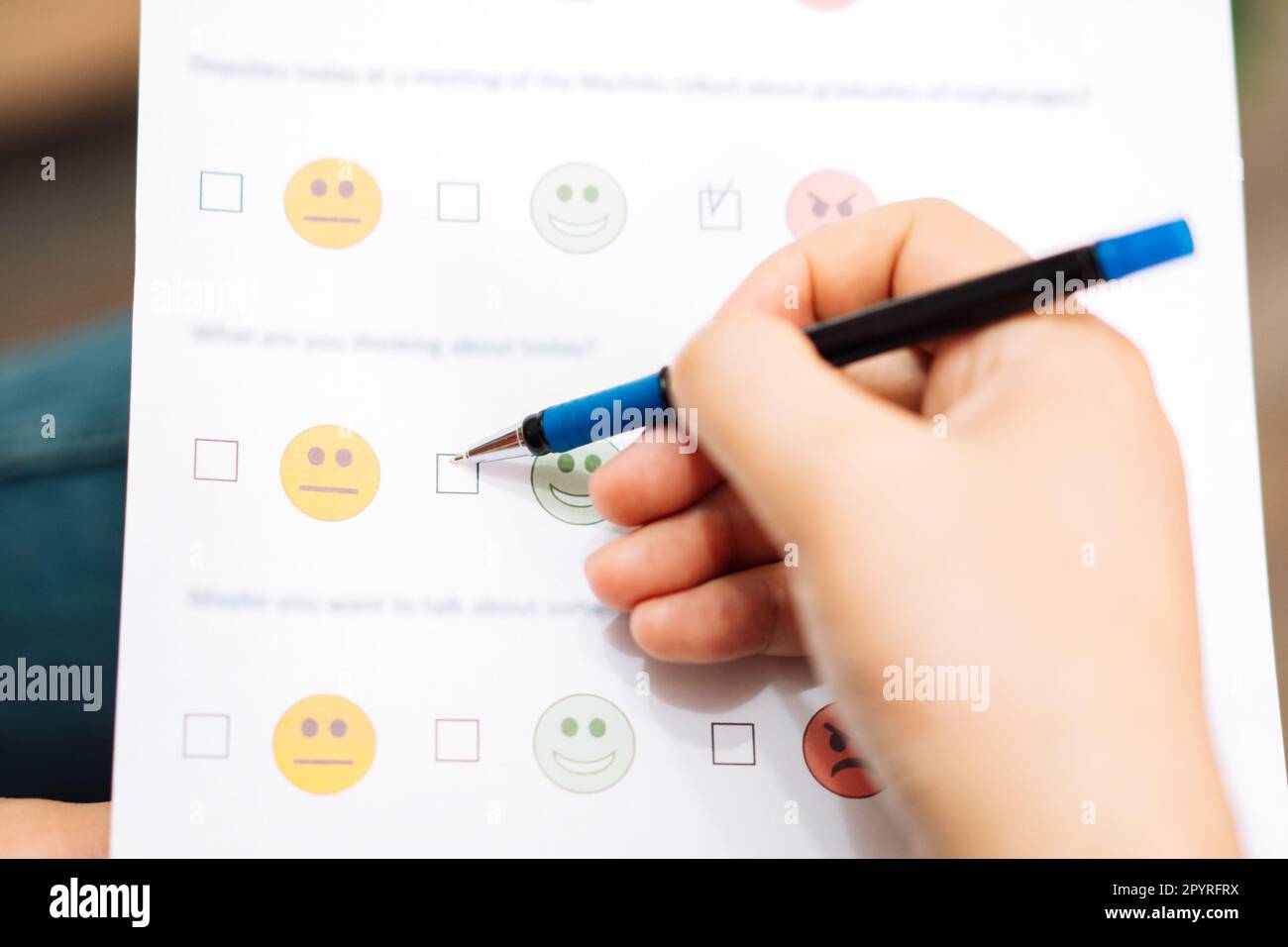 Patient undergoing psychological test with emoticons Stock Photo - Alamy