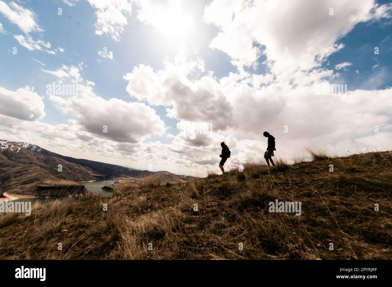 2 men hiking down from Cervidae Peak in Boise Idaho Stock Photo - Alamy
