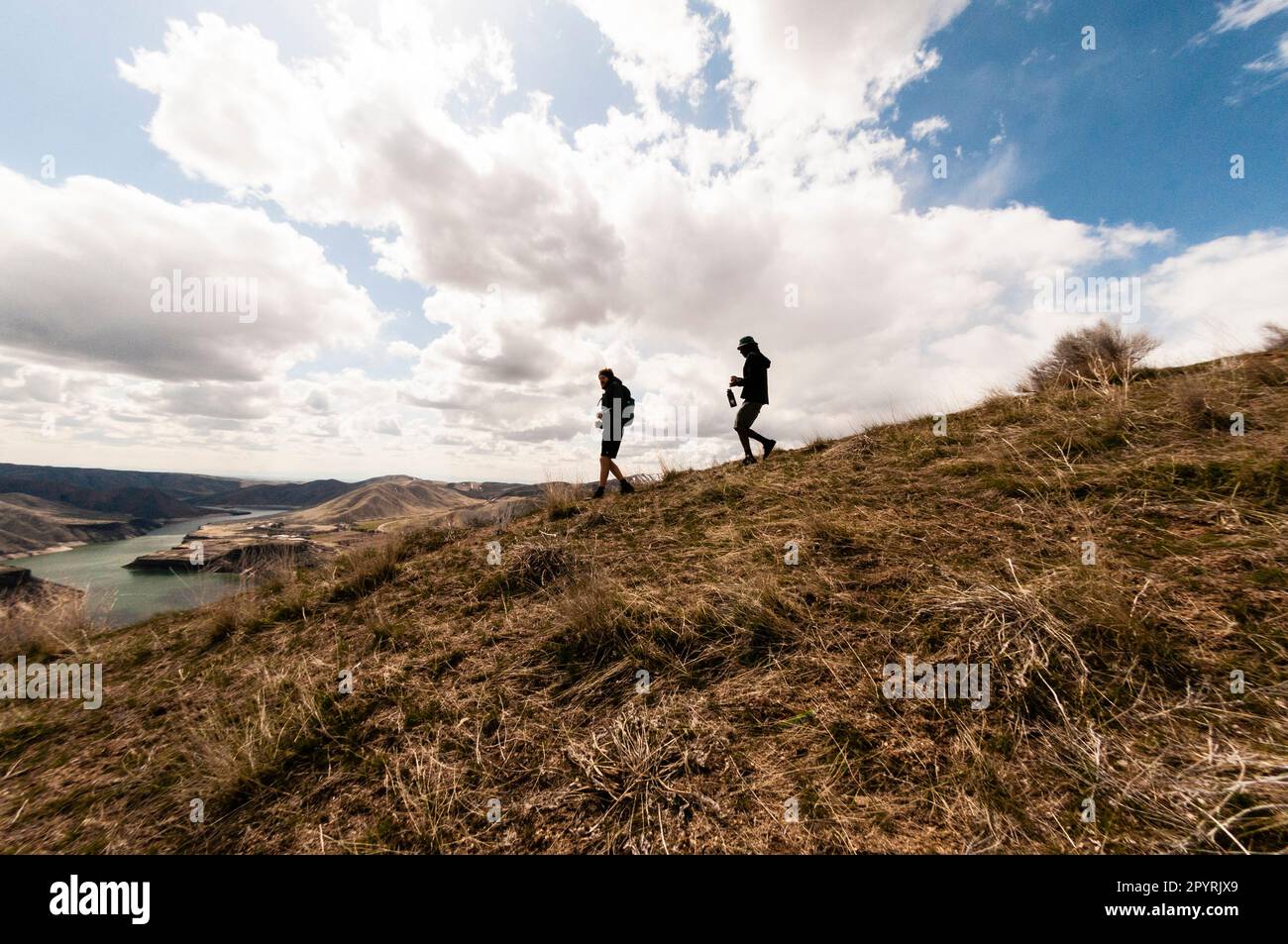 2 men hiking down from Cervidae Peak in Boise Idaho Stock Photo - Alamy