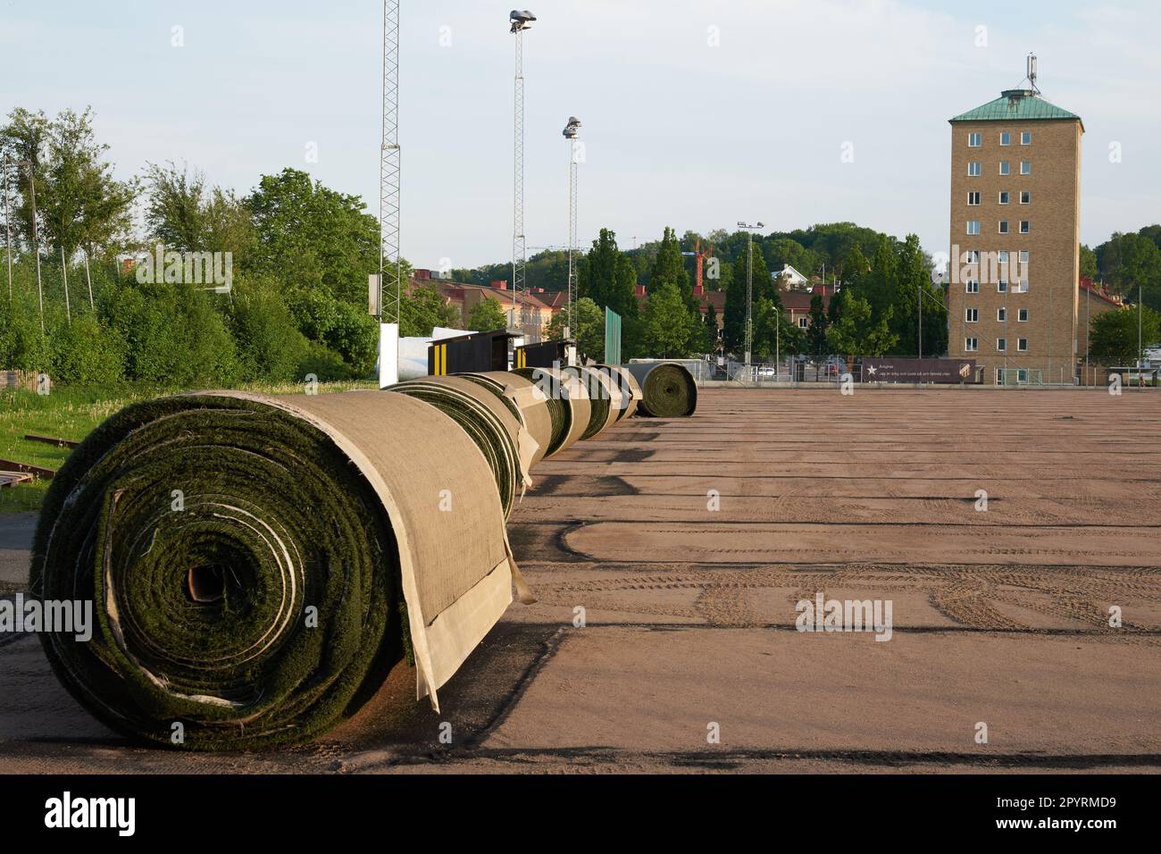 Build of a football field with artificial grass Stock Photo - Alamy