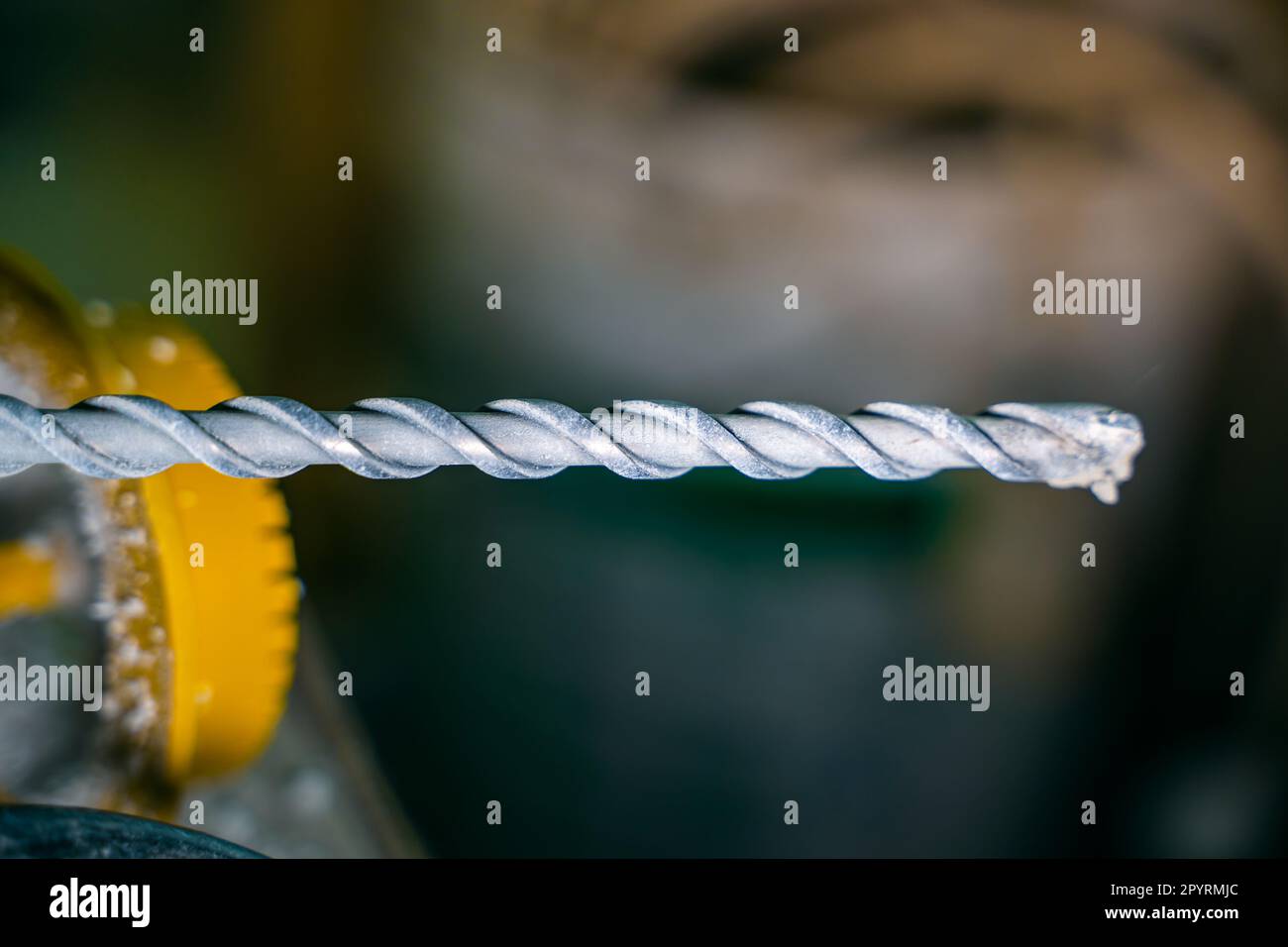 Close-up of a long drill for a perforator. Nozzle for drilling holes in ...