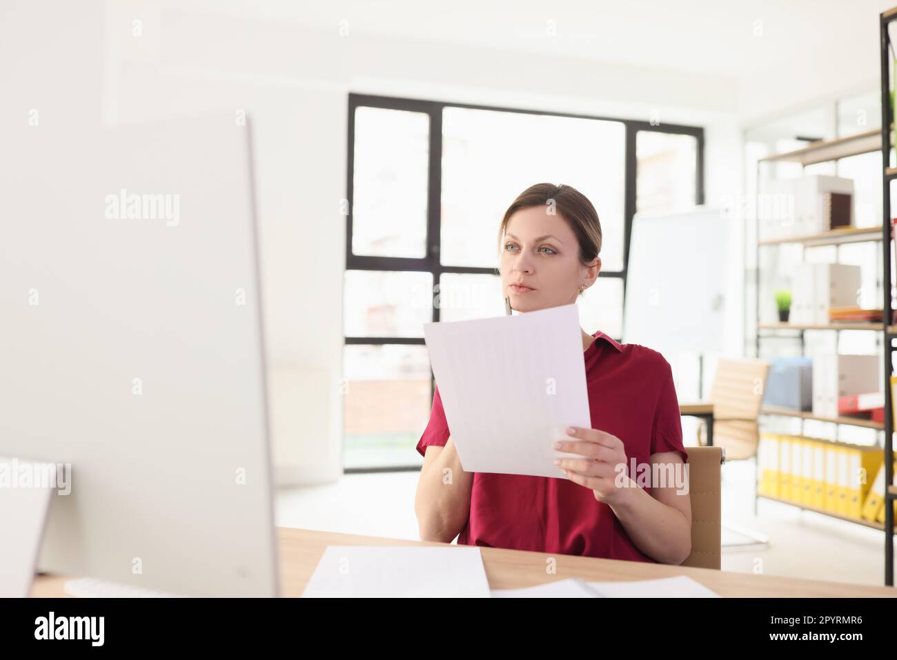 Secretary holds project paper hi-res stock photography and images - Alamy