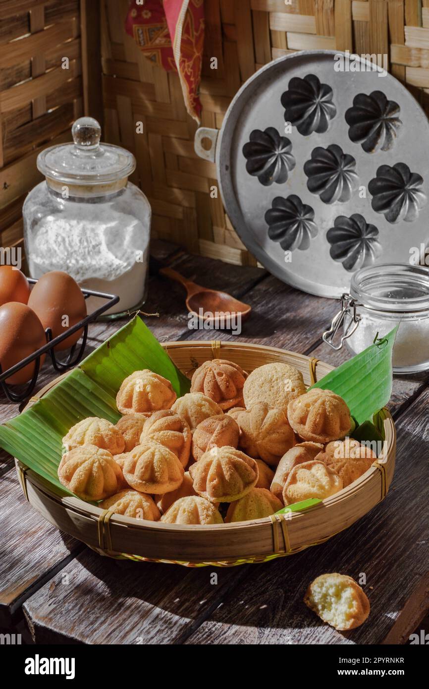 Malaysian traditional sweet sponge cake called Kuih Bahulu or bolu on a ...