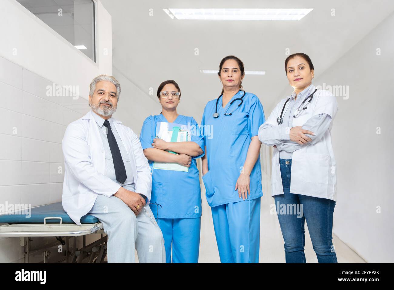 Team of confident indian male and female doctors nursing staff with ...