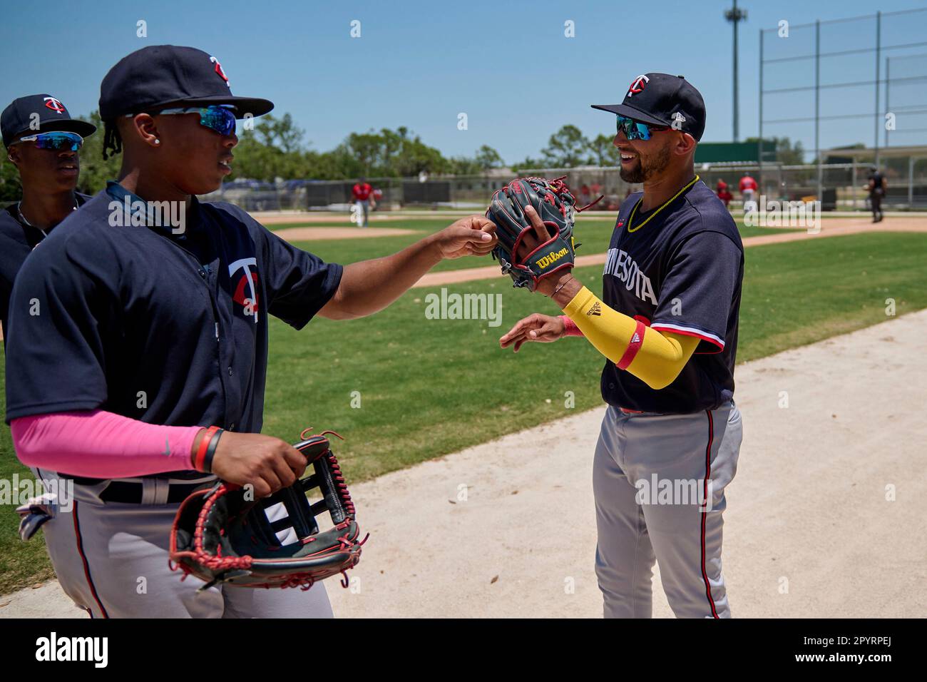 Minnesota Twins shortstop Royce Lewis (8) fist bumps outfielder Yasser ...