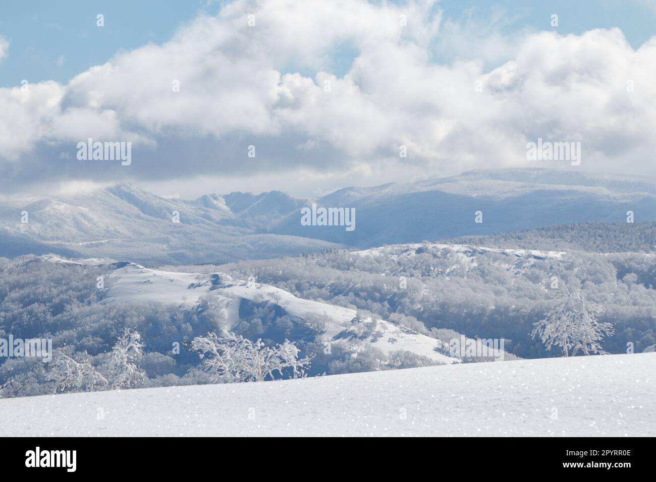 Snowy winter mountain and valley landscape, Rusutsu, Hokkaido, Japan ...