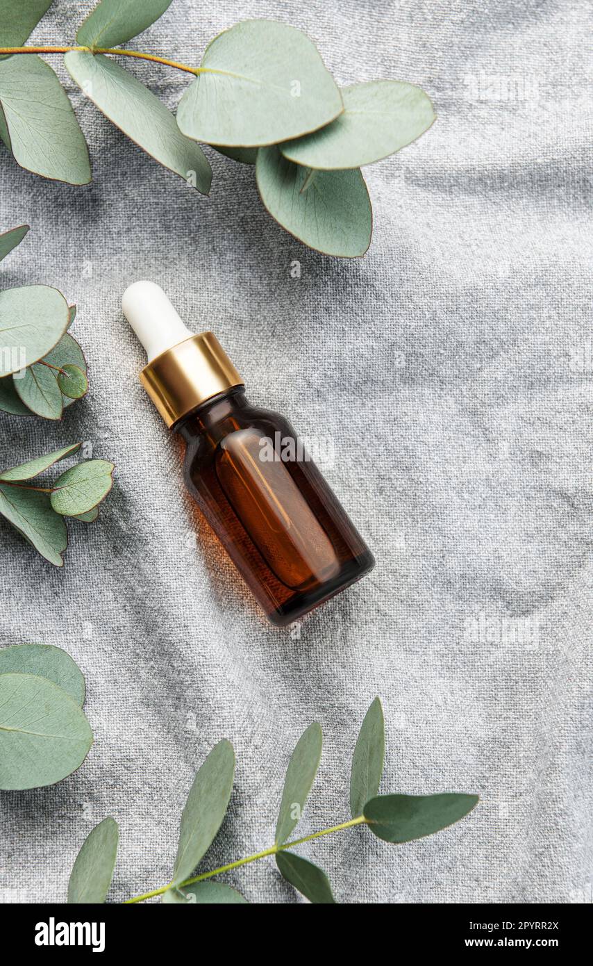 Massage and Spa products with eucalyptus on a textile fabric background ...
