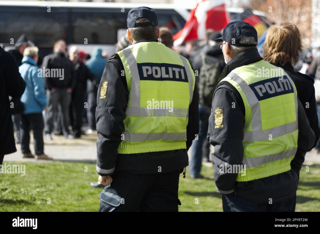 Law enforcement, safety and crowd control with police officer in city ...