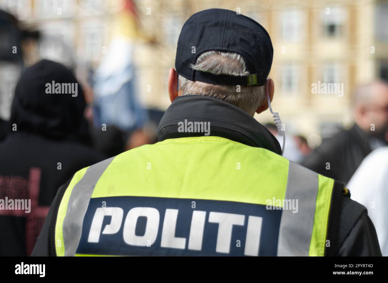 Law enforcement, protection and security with police officer in crowd ...