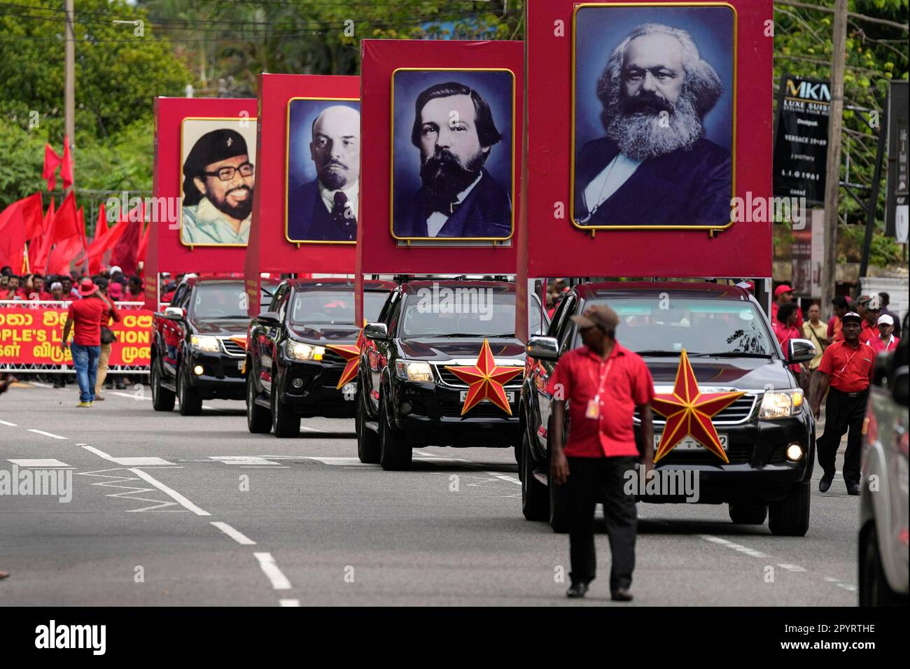 Portraits of Communist icons, from right, Karl Marx, Friedrich Engels ...