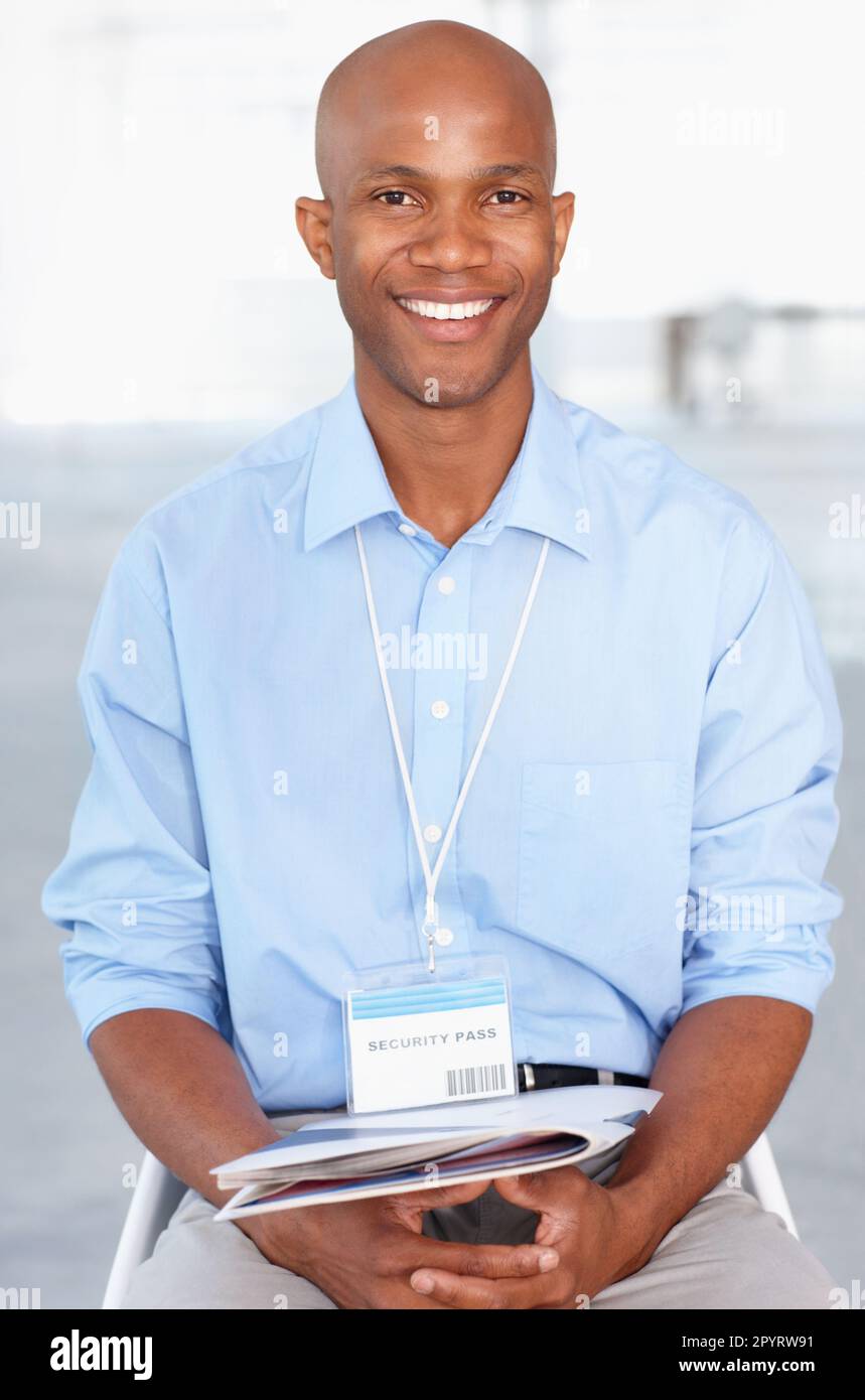 Business, portrait and young black businessman sitting in workshop and ...