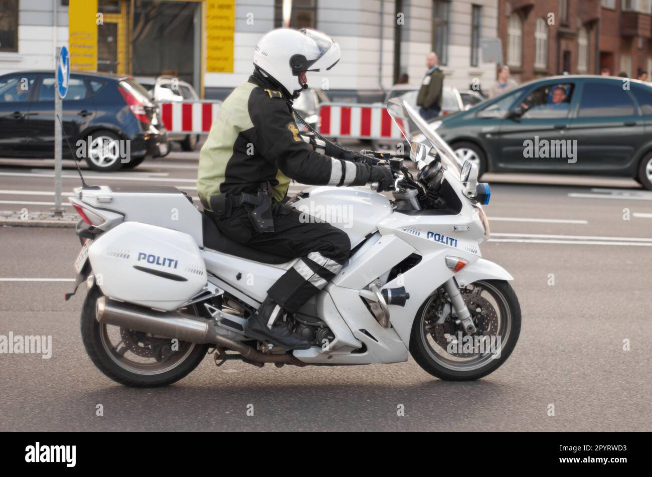 Police, motorbike and road safety officer working for protection and ...