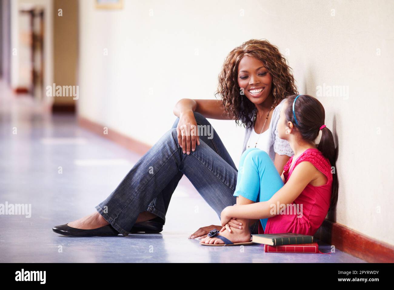 Teacher, student and talking or conversation at school for support ...