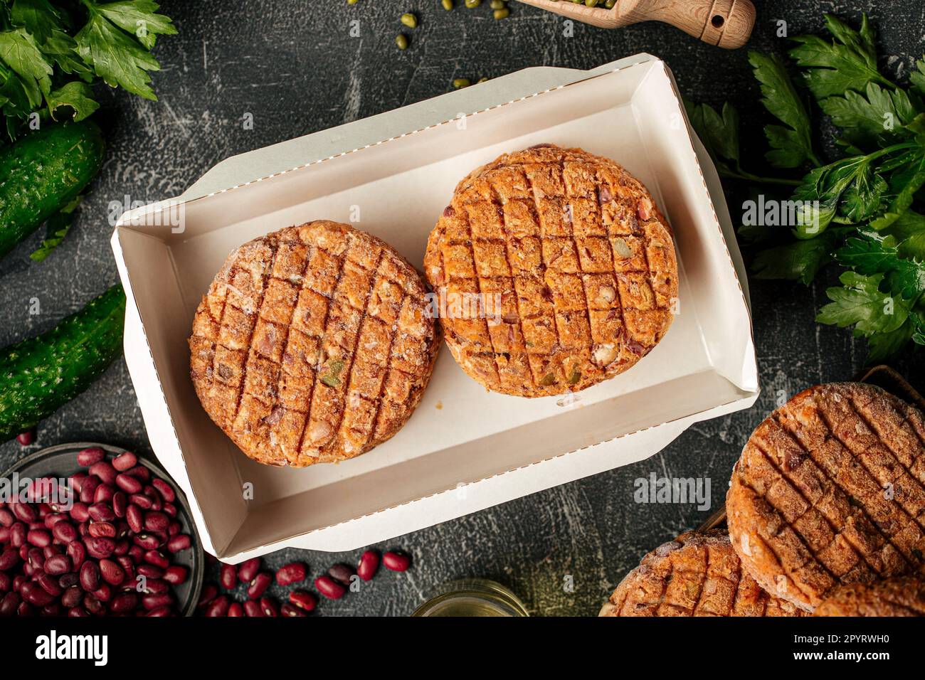 Portion of packed vegetarian cutlets in box Stock Photo - Alamy