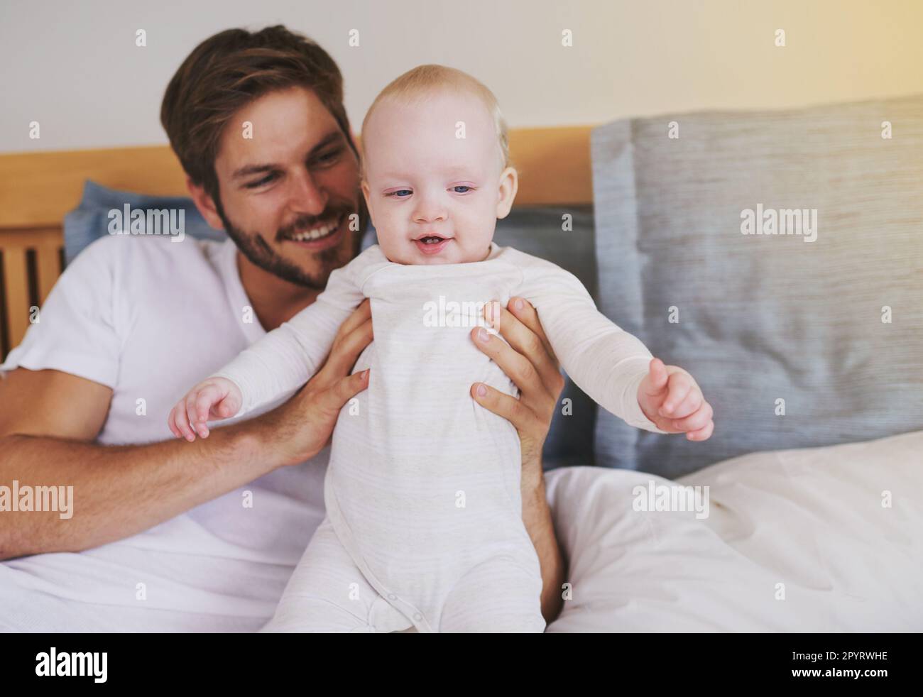 Whos daddys big girl. a young father and his baby daughter in the ...