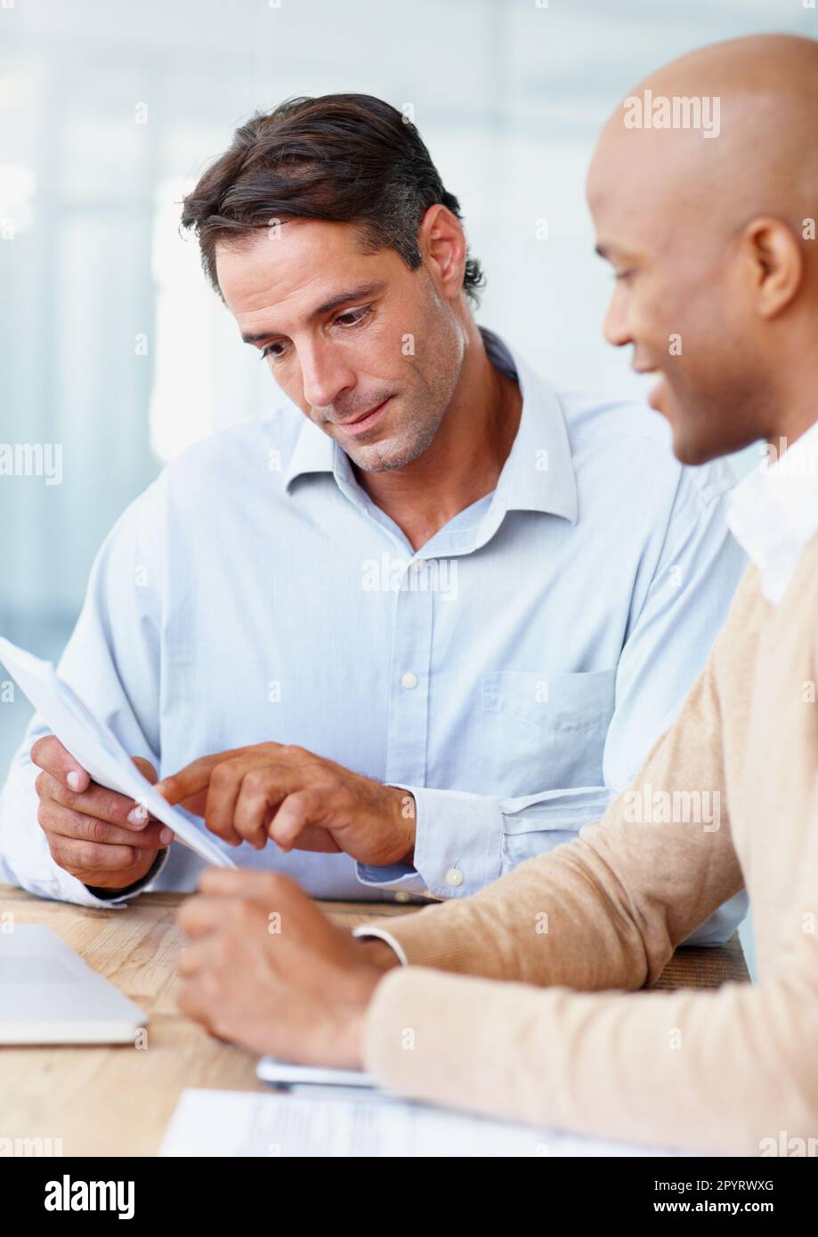 Business, documents and men in a meeting for planning, brainstorming ...