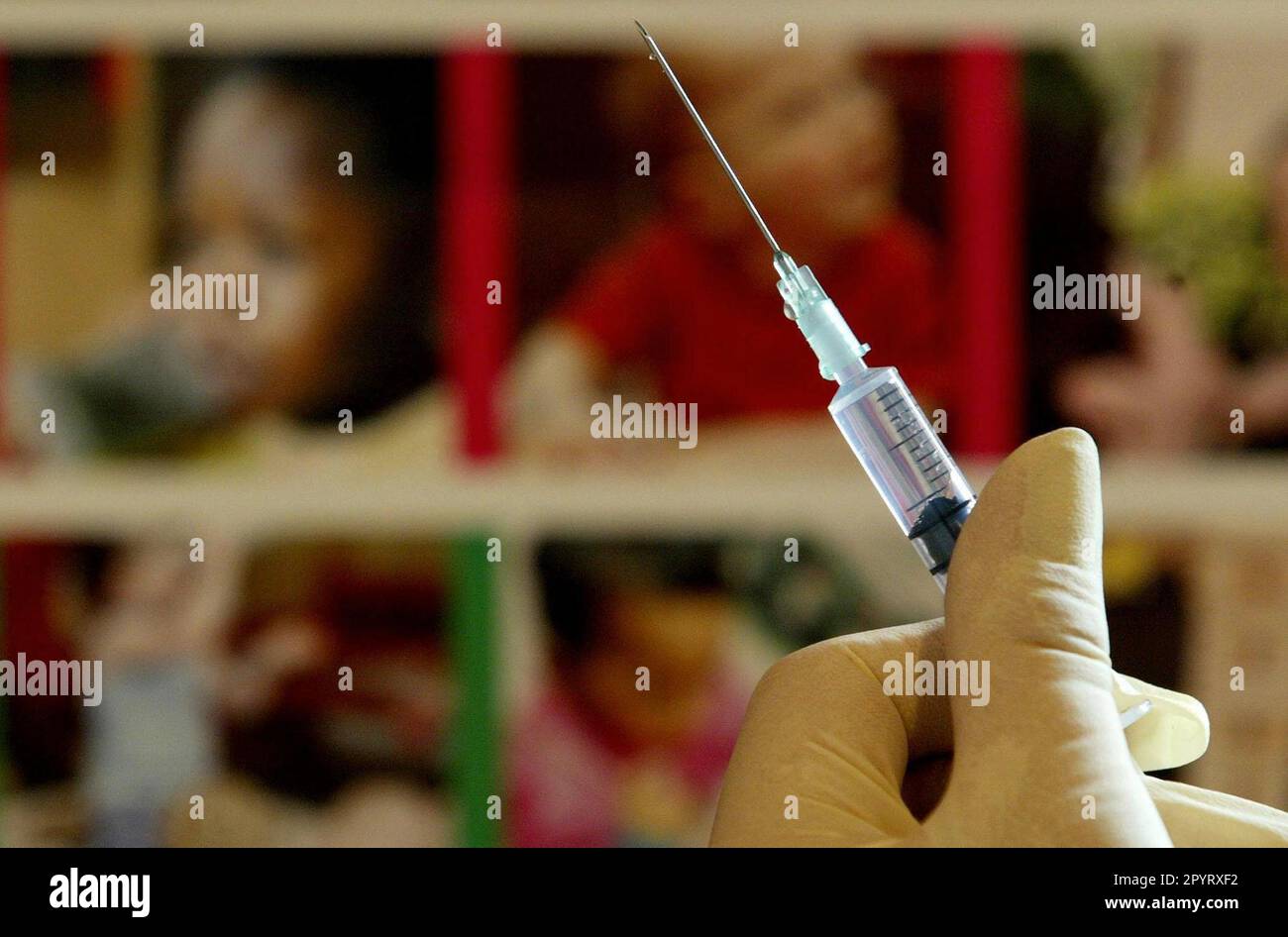File photo dated 10/09/2014 of a nurse handling a syringe at a medical ...