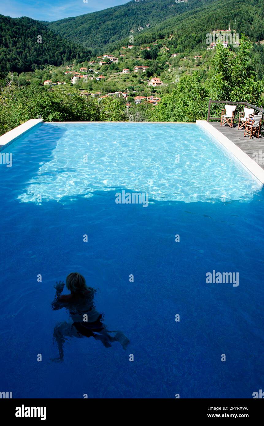 Swimming pool with fantastic view in Zarouchla village, Greece Stock ...